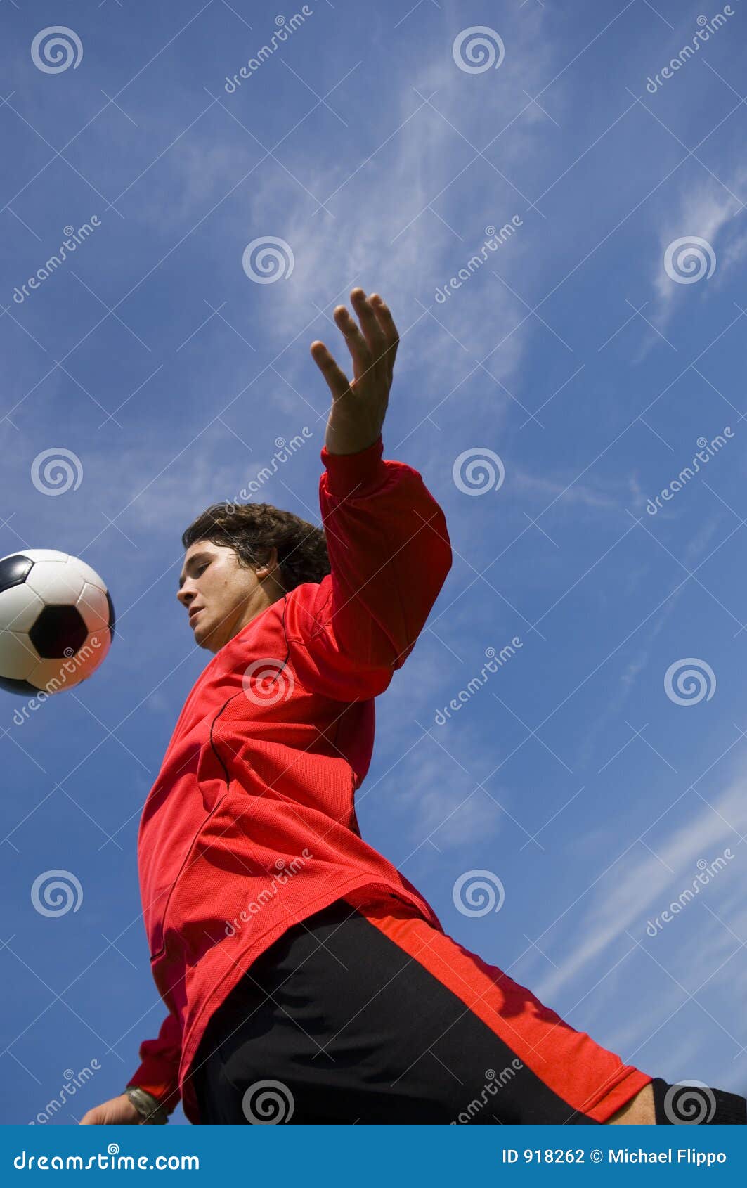Soccer Football Player in Red Controlling Ball Stock Photo - Image of ...