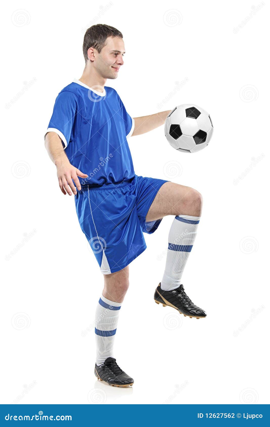 Soccer player with a ball stock photo. Image of playing - 12627562