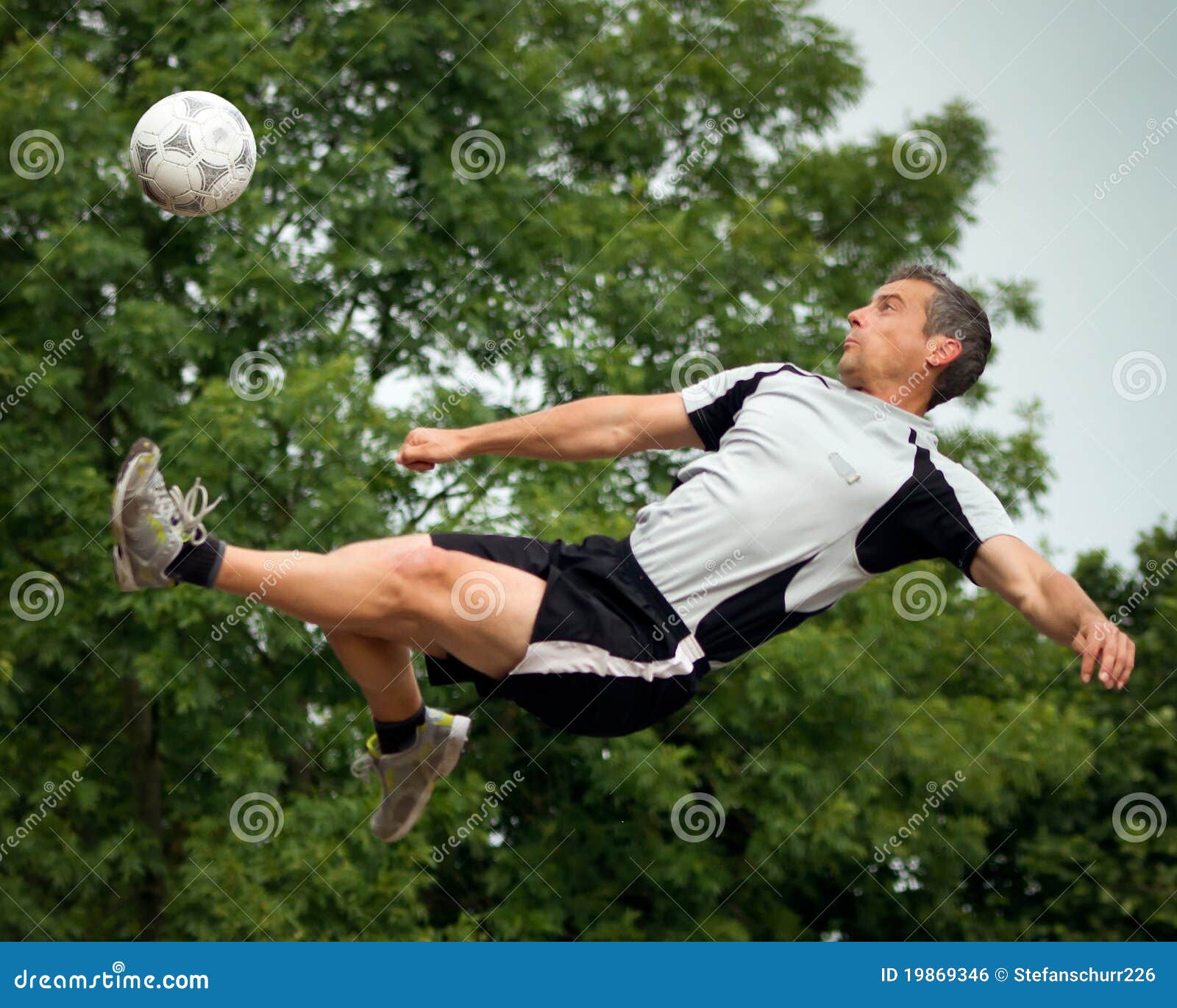 Soccer Player in a Bicycle Kick Stock Photo - Image of training ...