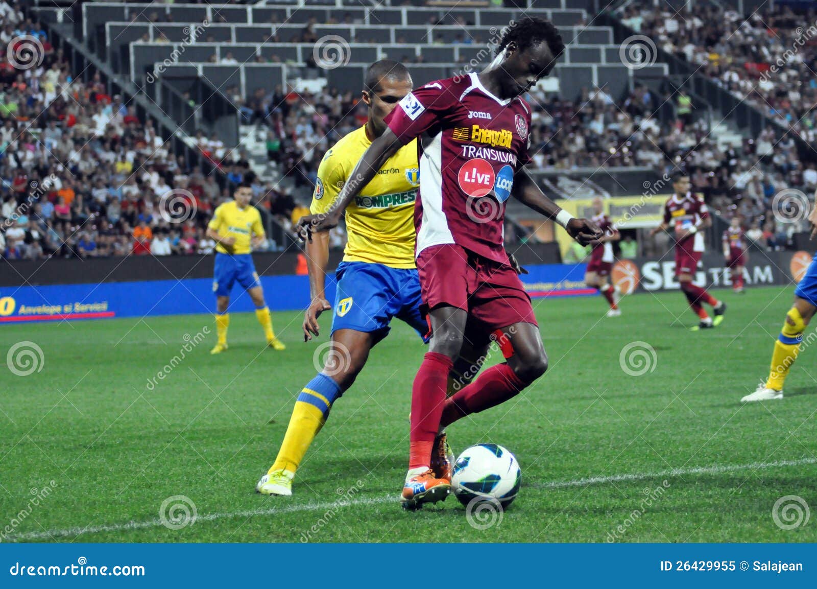 Soccer player dribbling editorial image. Image of ball - 26429955