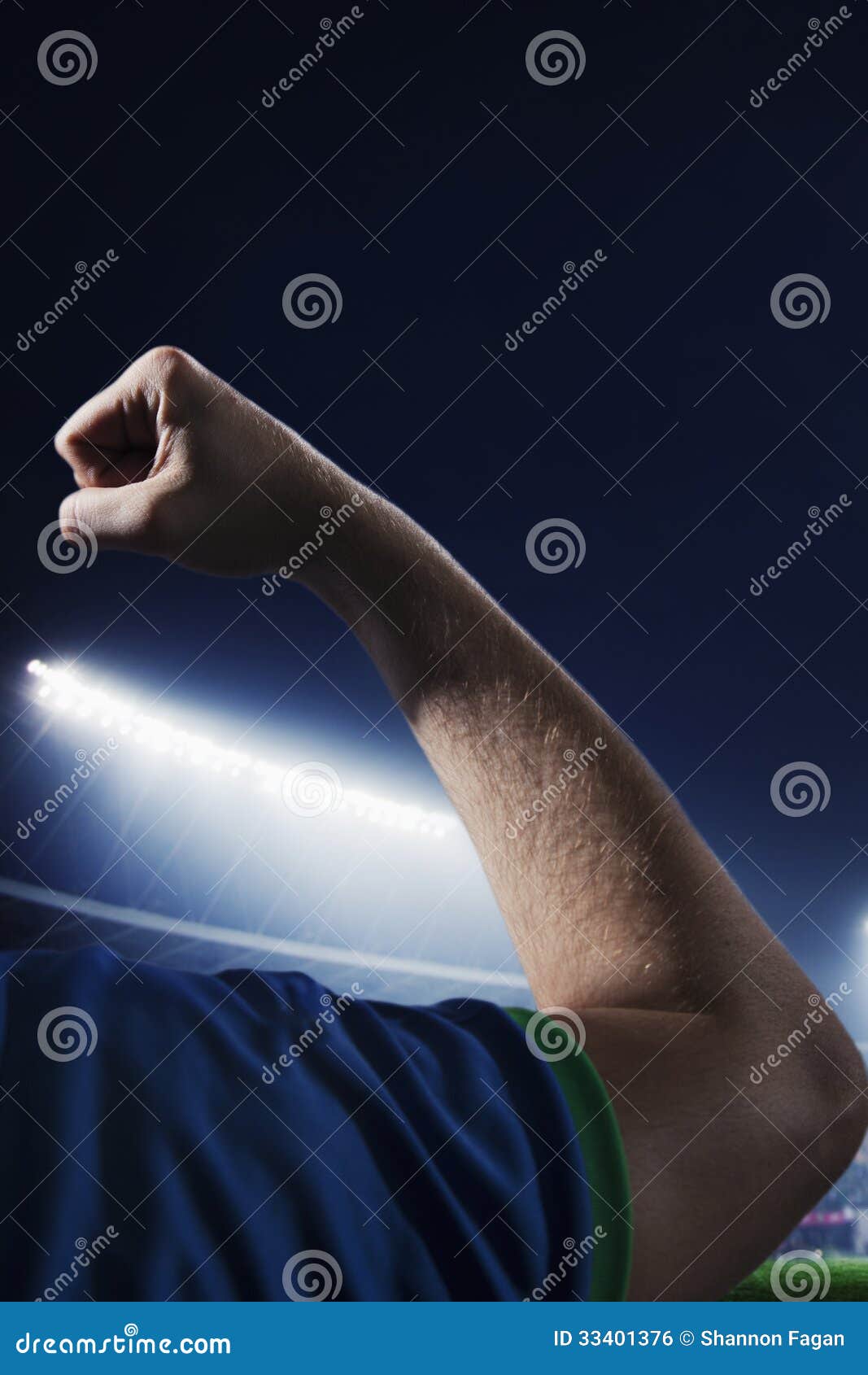 Soccer Player Flexing Bicep in a Stadium at Night Time Stock Photo ...