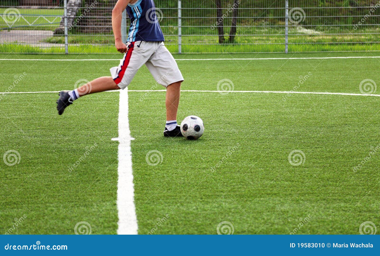 Soccer player kicking stock photo. Image of pass, play - 19583010