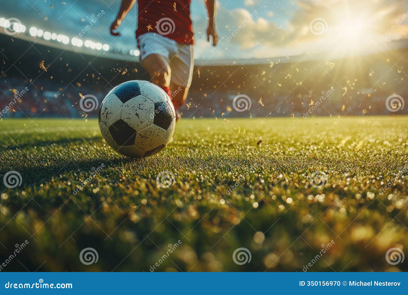 Soccer Player Running with Ball on Field during Sunset Game Stock Photo ...