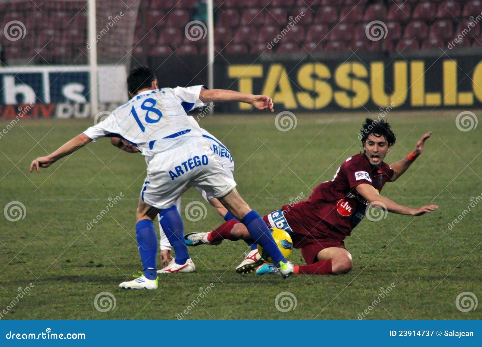 Soccer players in action editorial photography. Image of match - 23914737