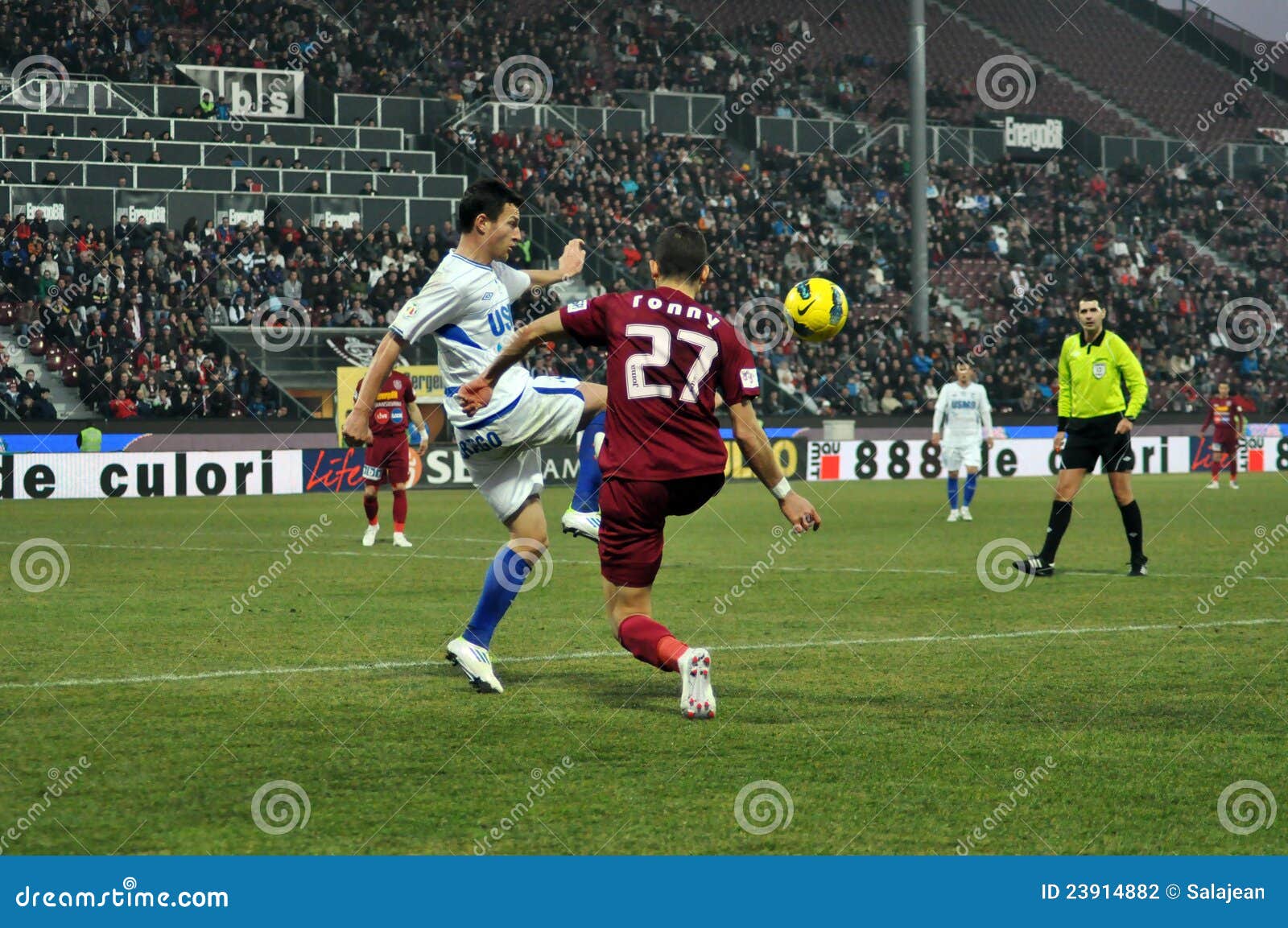 Soccer players in action editorial photography. Image of kicking - 23914882