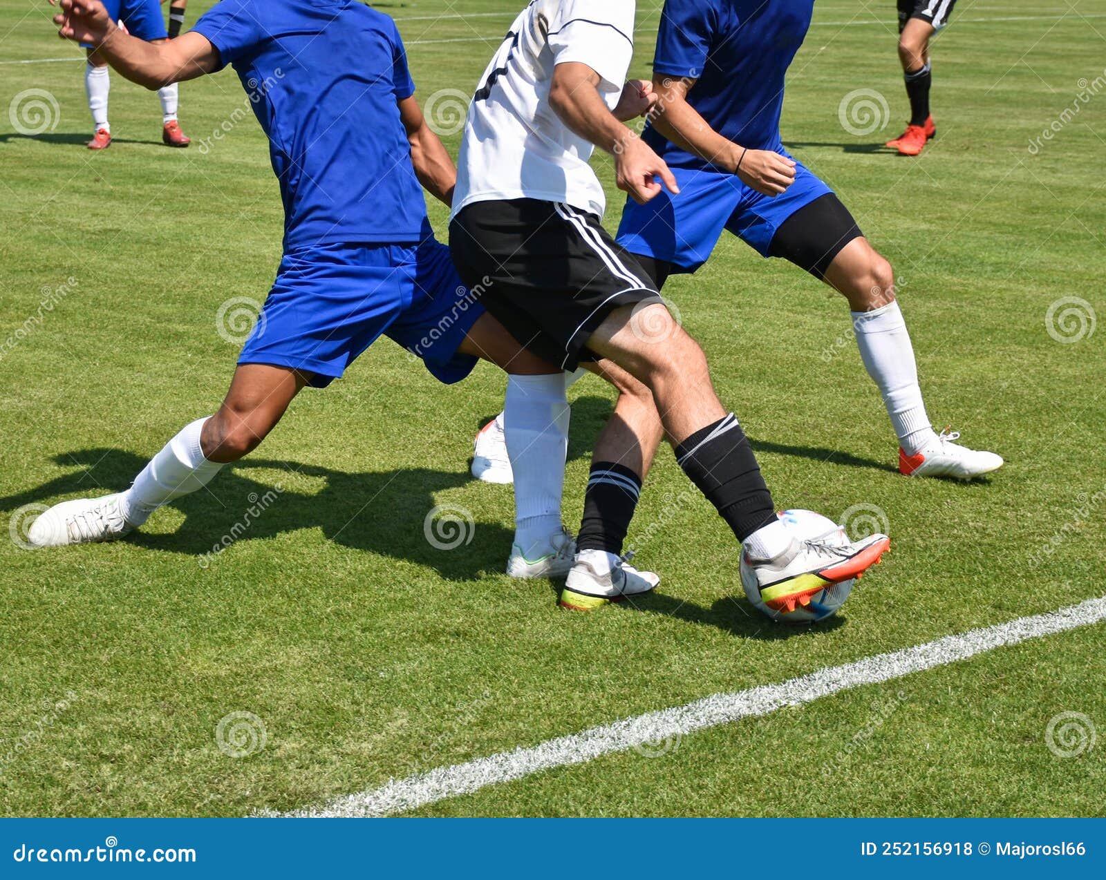 Soccer Players in Action Outdoor Match Stock Photo - Image of blue ...