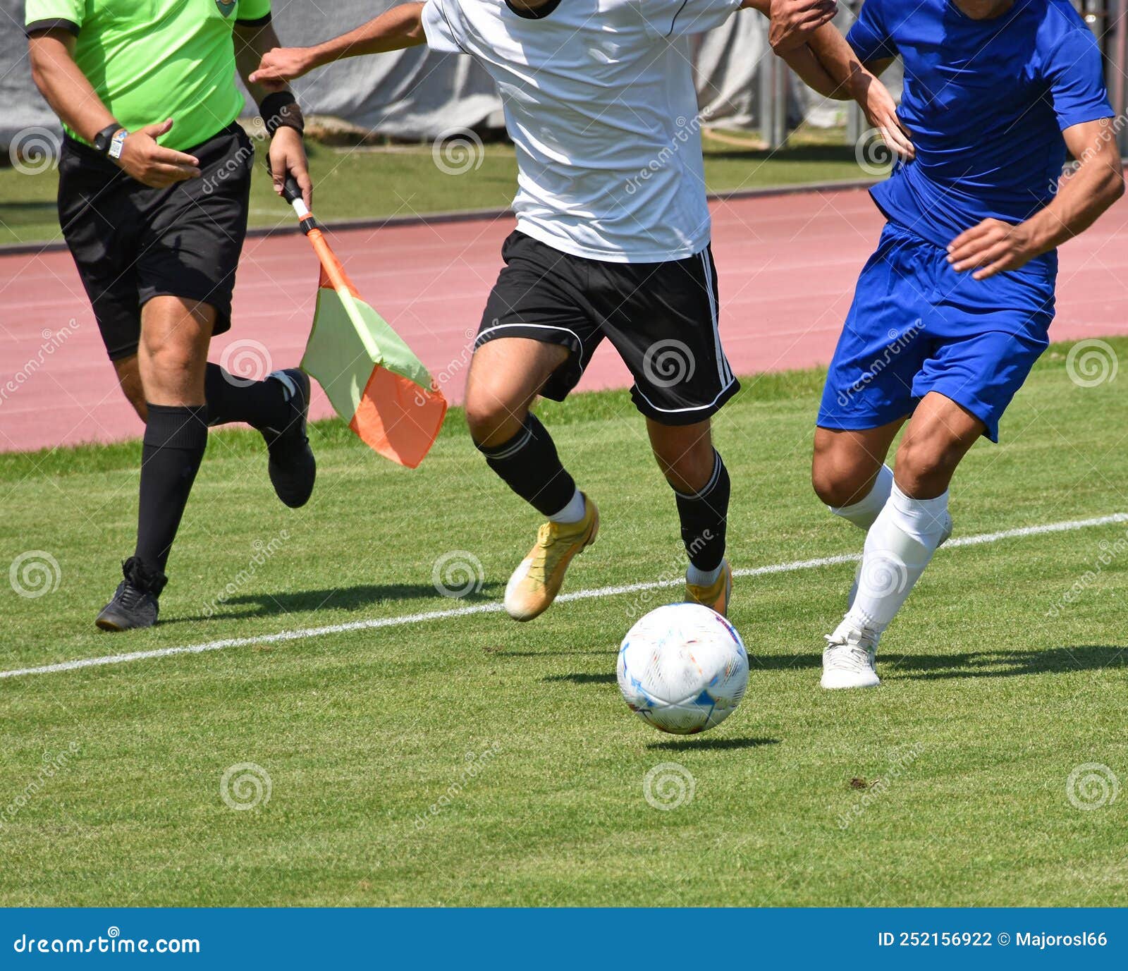 Soccer Players in Action Outdoor Match Stock Photo - Image of running ...