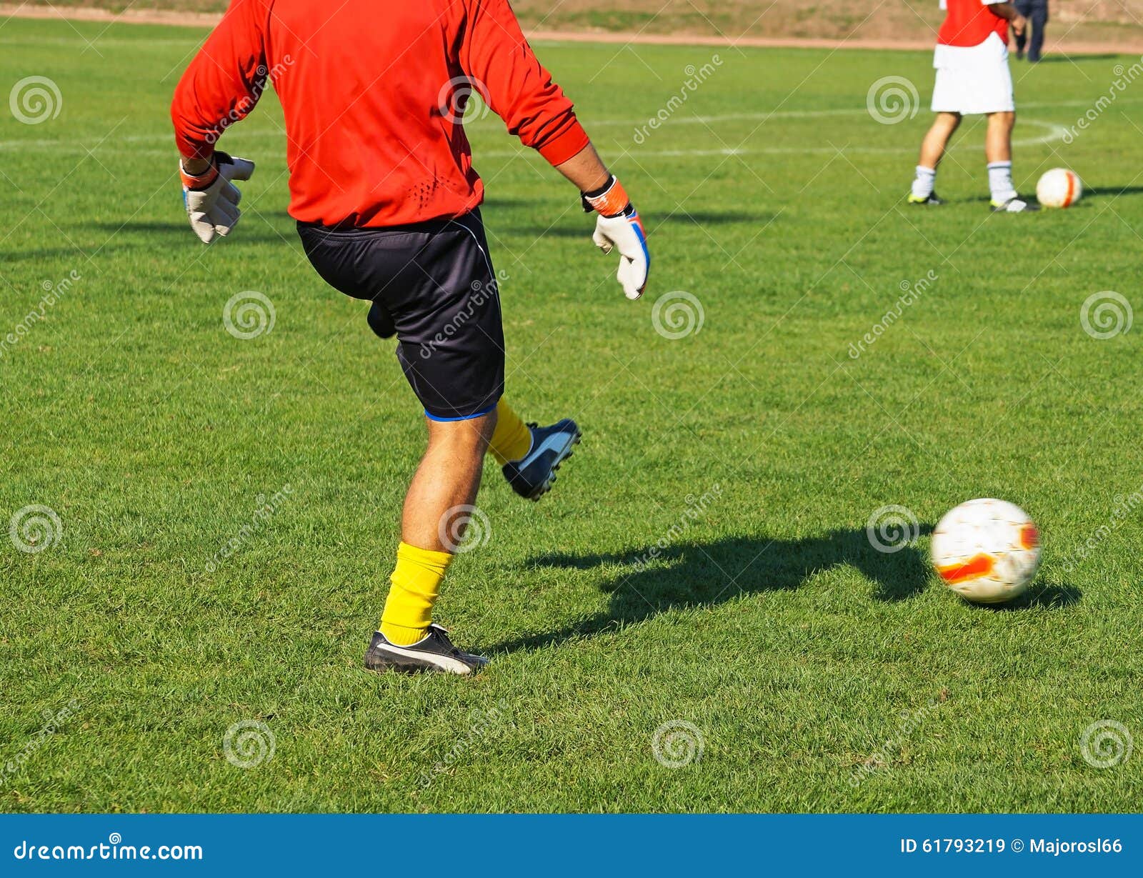 Soccer players with ball stock image. Image of young - 61793219