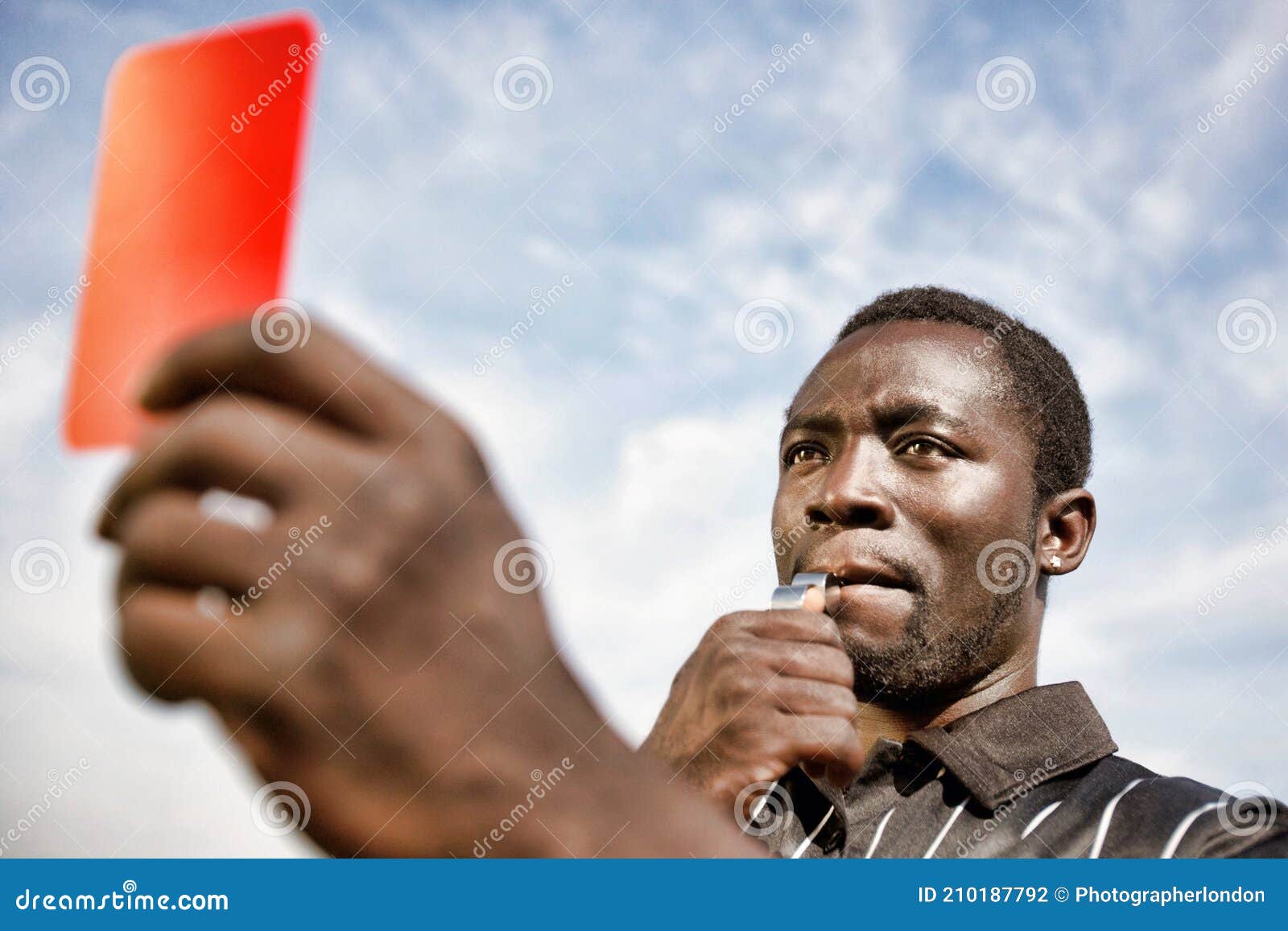Soccer Referee Holding Out a Red Card Stock Photo - Image of ...