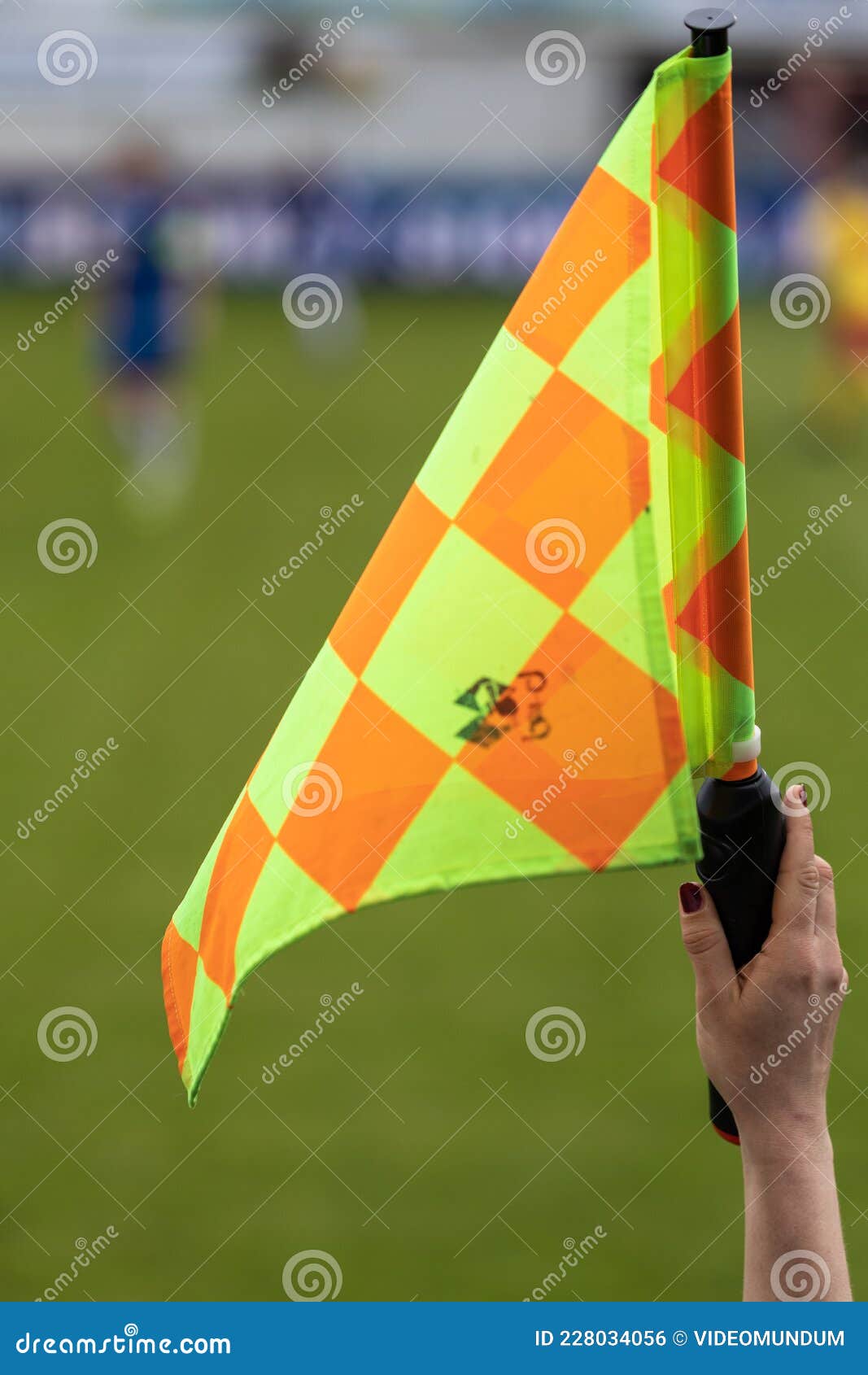 Soccer Referee Raising Hand with Signal Flag Stock Photo - Image of ...