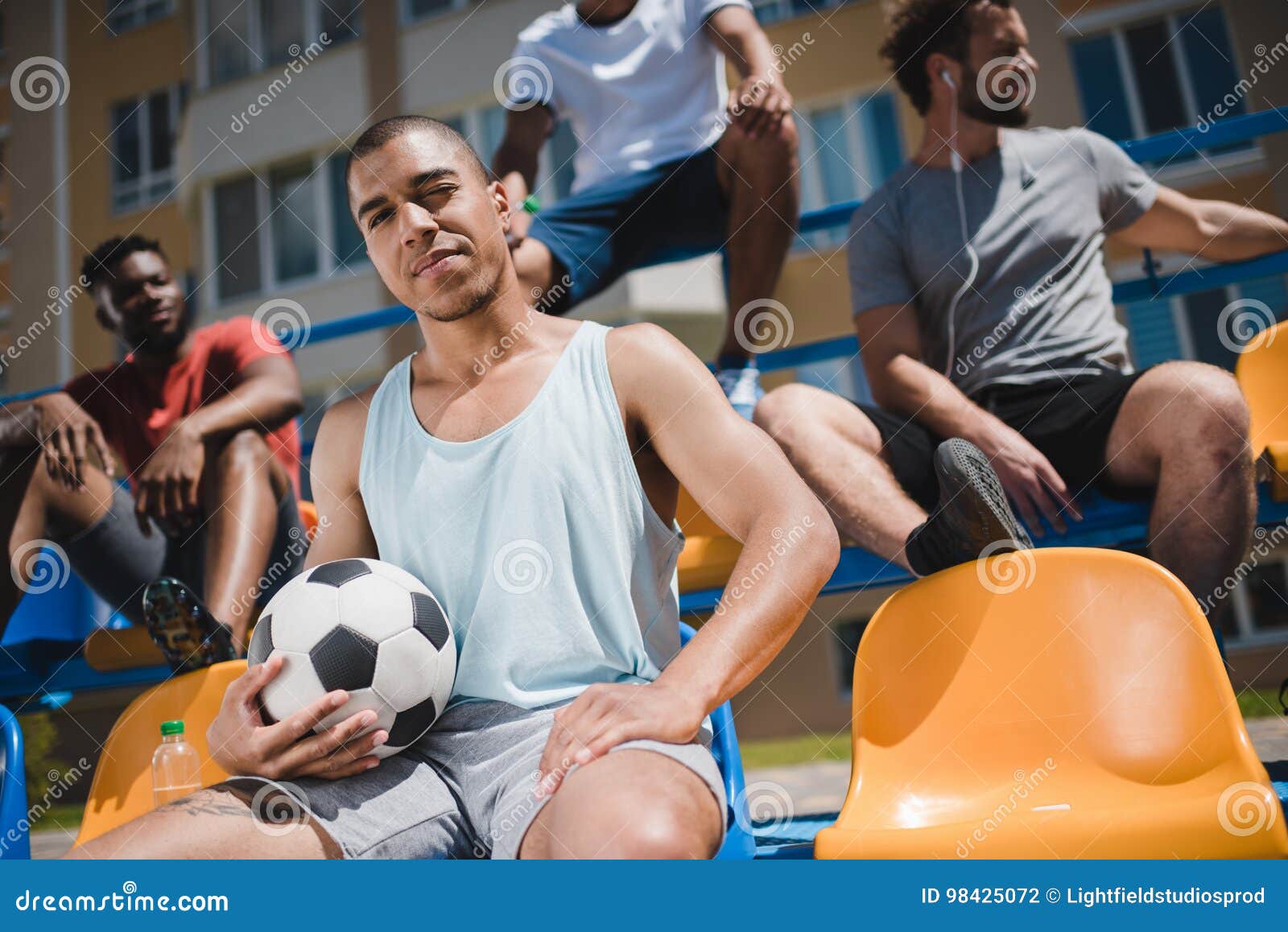 Soccer Team Resting on Stadium after Soccer Match Stock Photo - Image ...