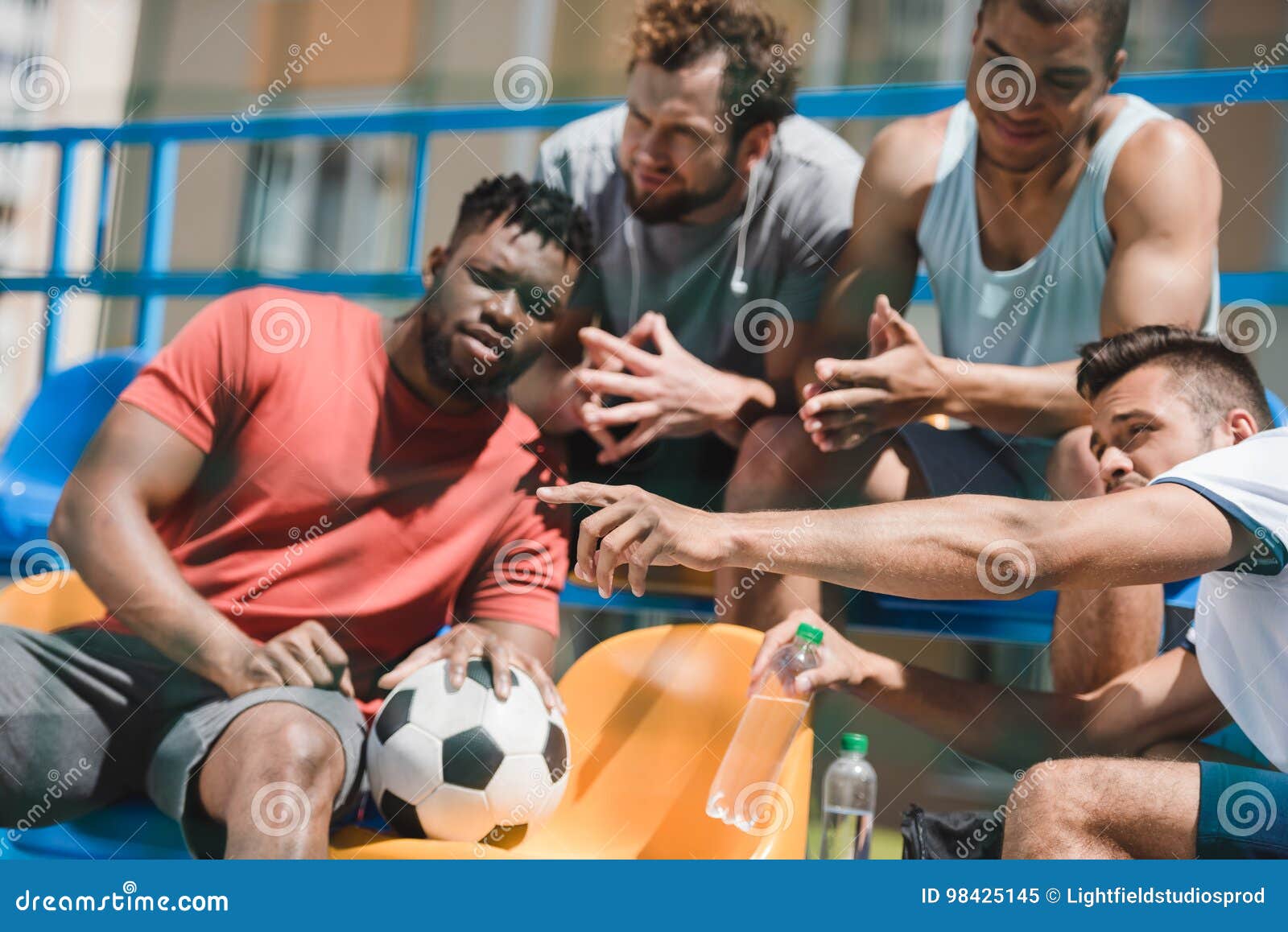 Soccer Team Resting on Stadium Together before Game Stock Image - Image ...