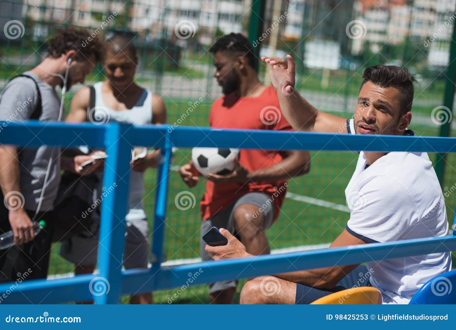 Soccer Team Resting on Stadium Together before Game Stock Image - Image ...