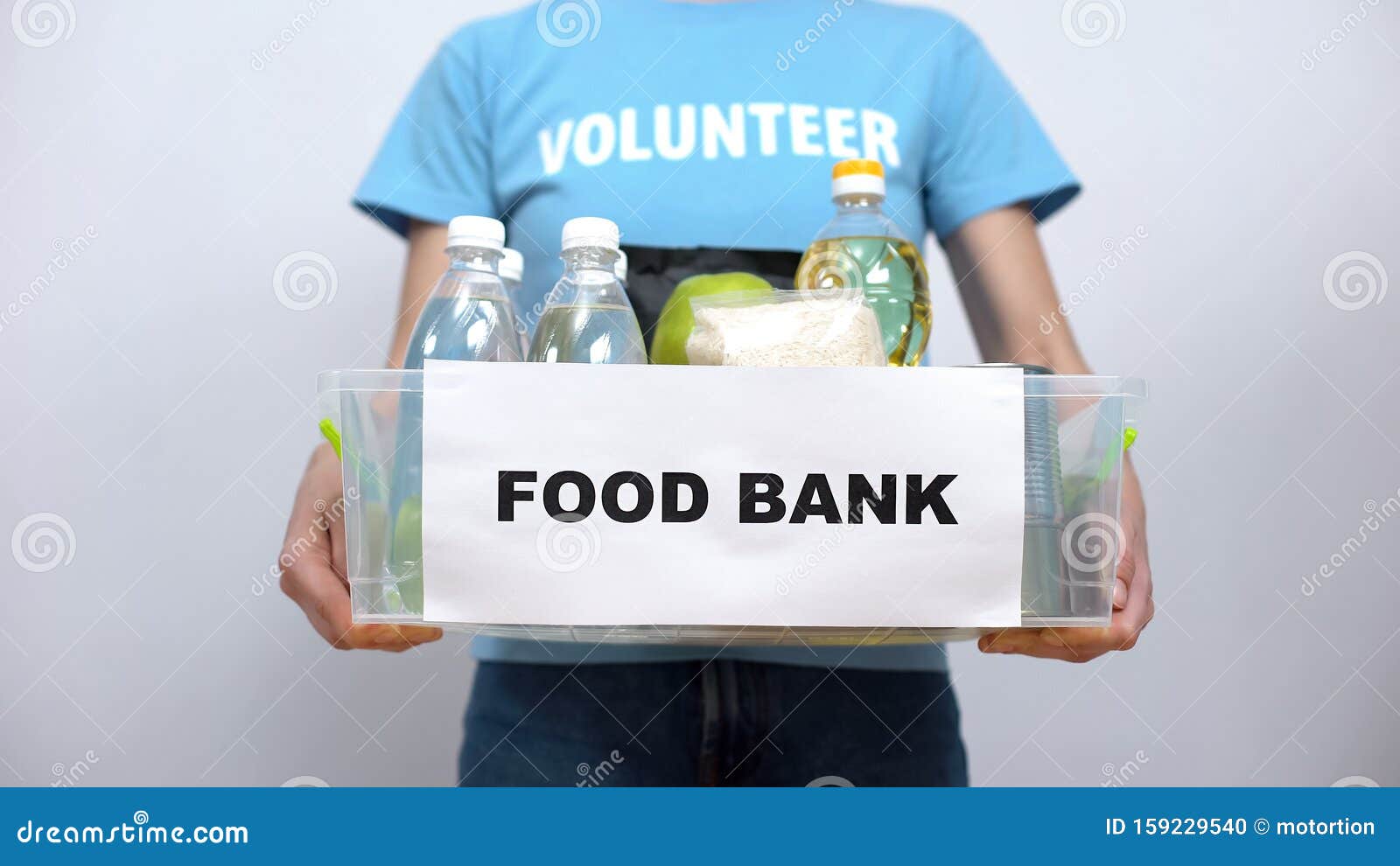 Social Activist Holding Food Bank Container, Provision Project Charity ... Social Activist Holding Food Bank Container, Provision Project Charity ...