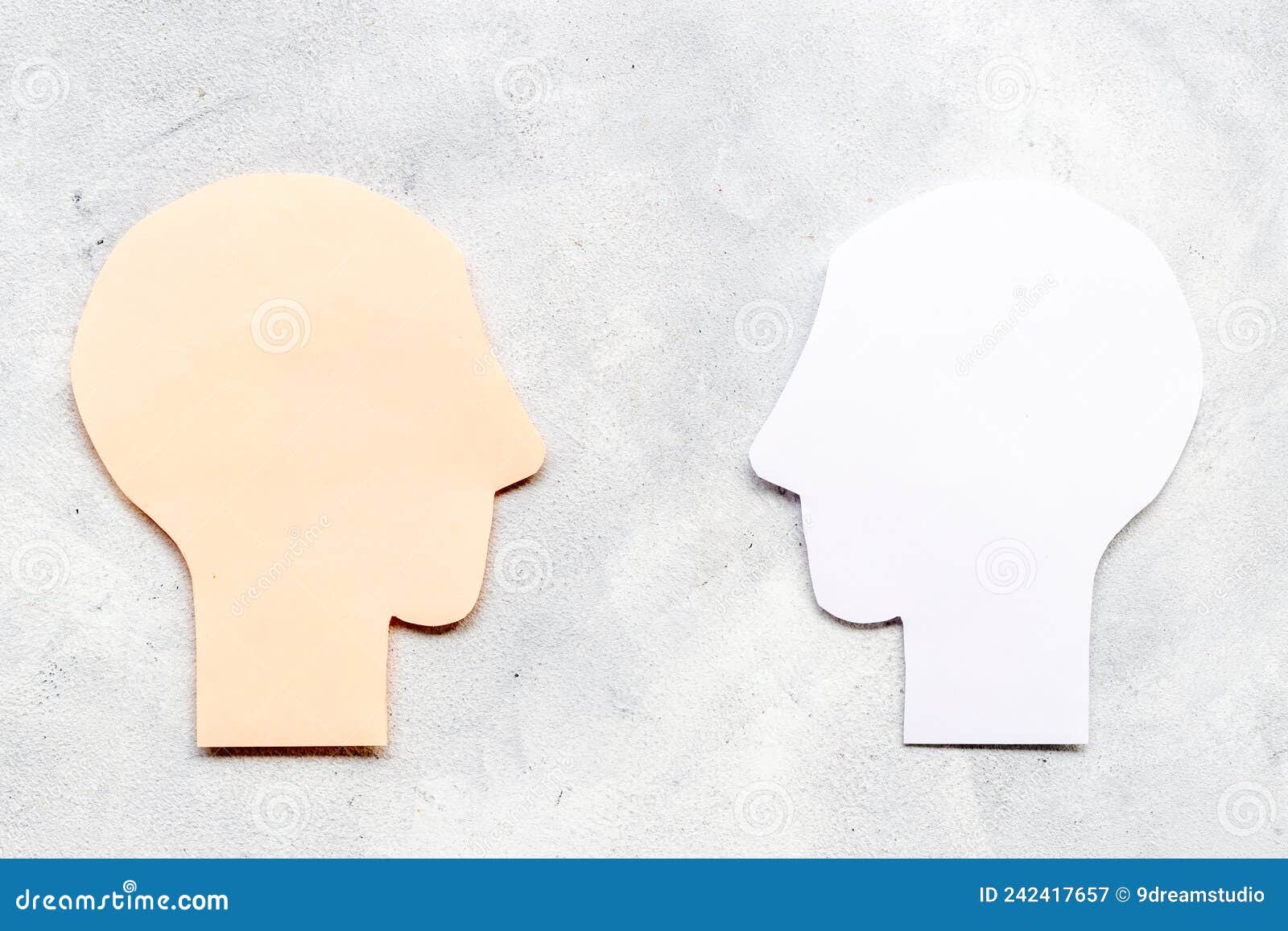 Social Communication and Connection Concept with Two Paper Human Heads ...