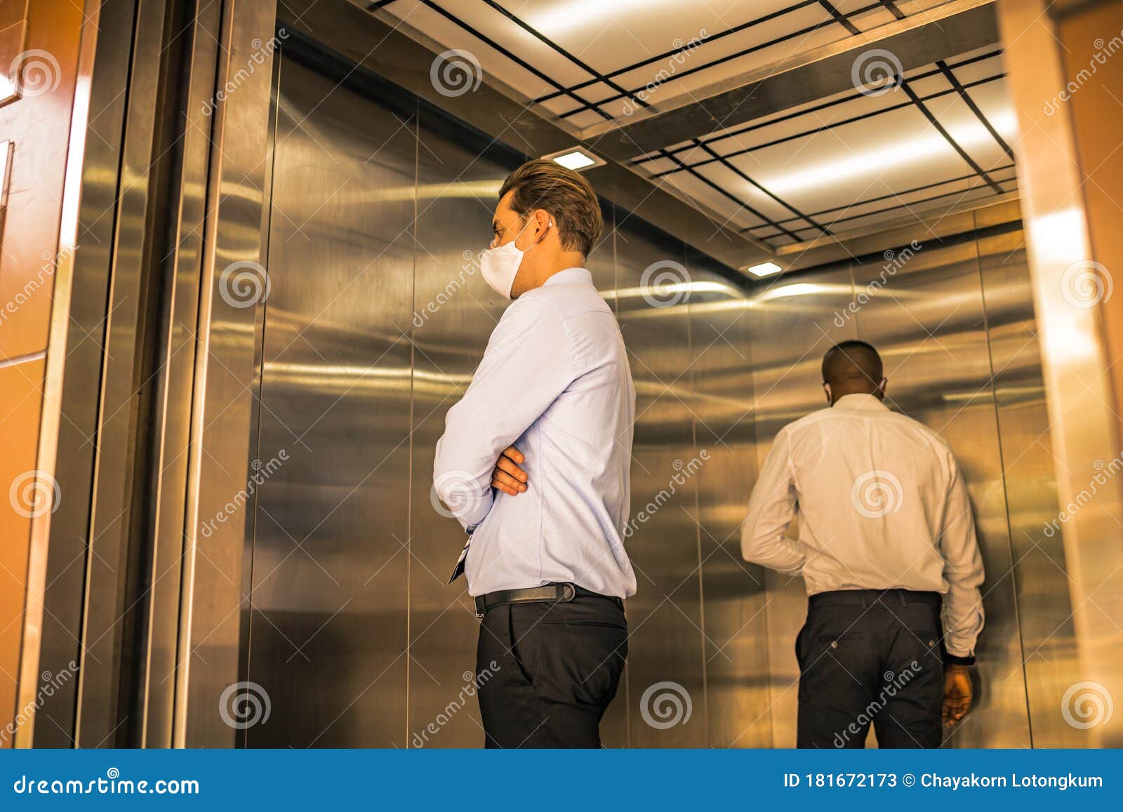 Social Distancing on Elevator with Passenger Stand in the Corner Stock ...