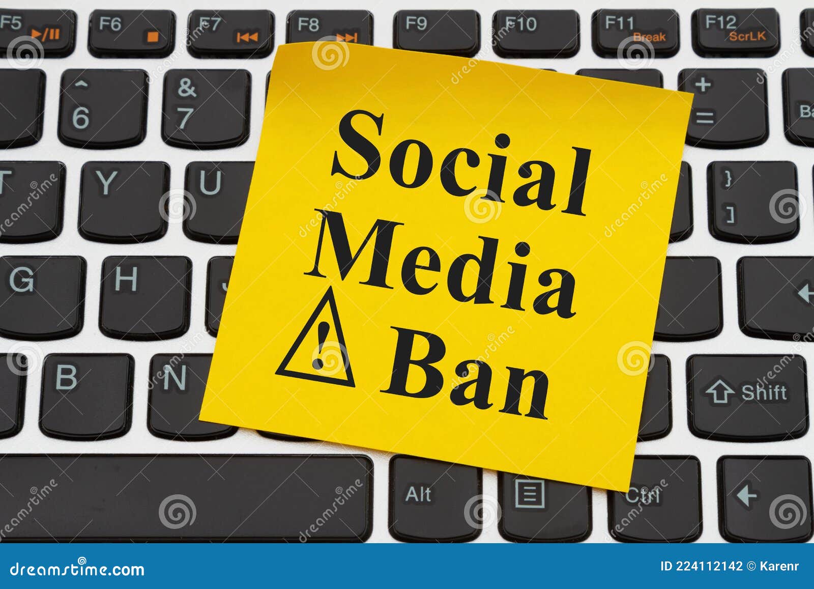 Social Media Ban Message on Yellow Sticky Note on a Keyboard Stock ...
