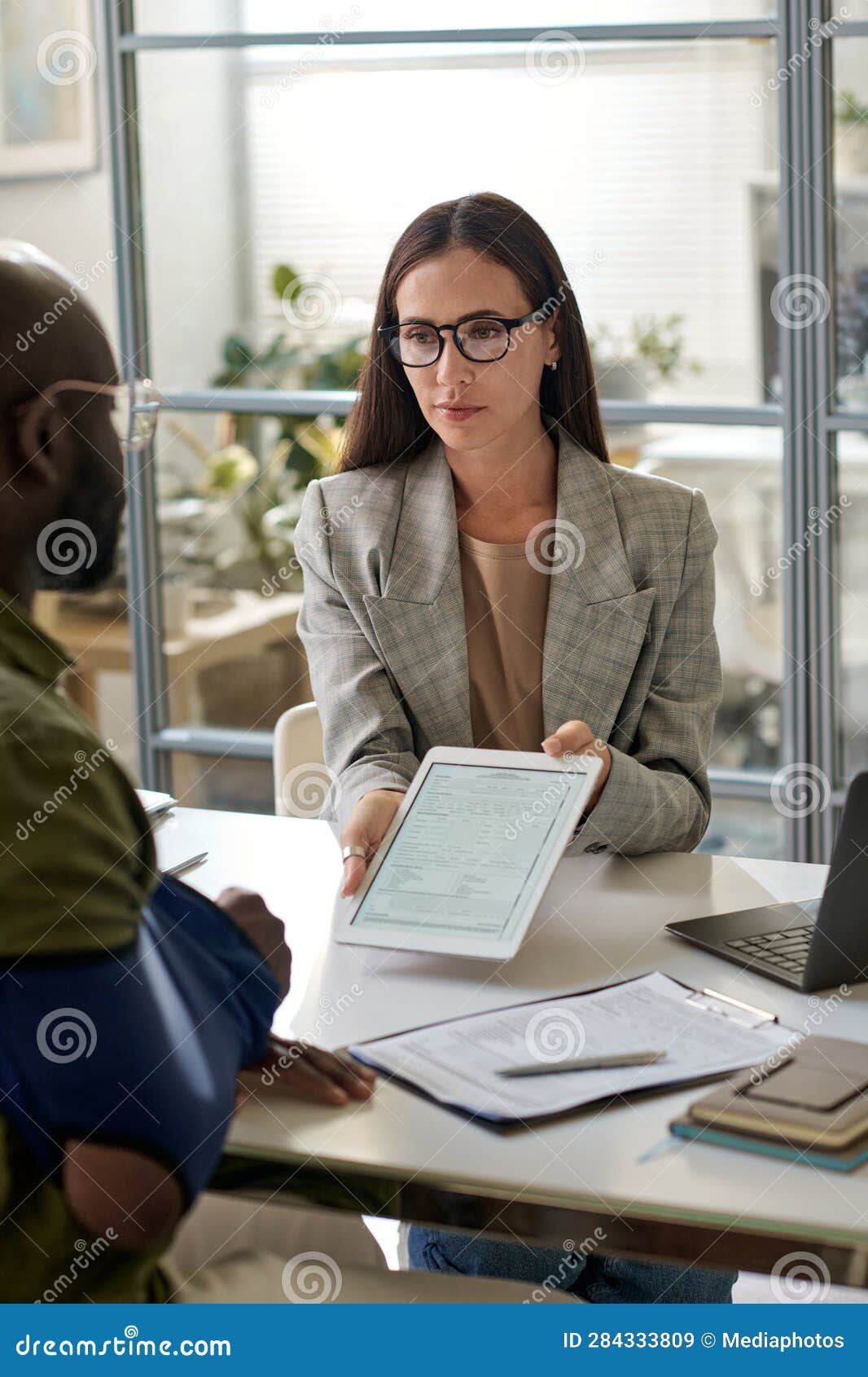 Social Worker Signing Contract with Client at Meeting Stock Image ...