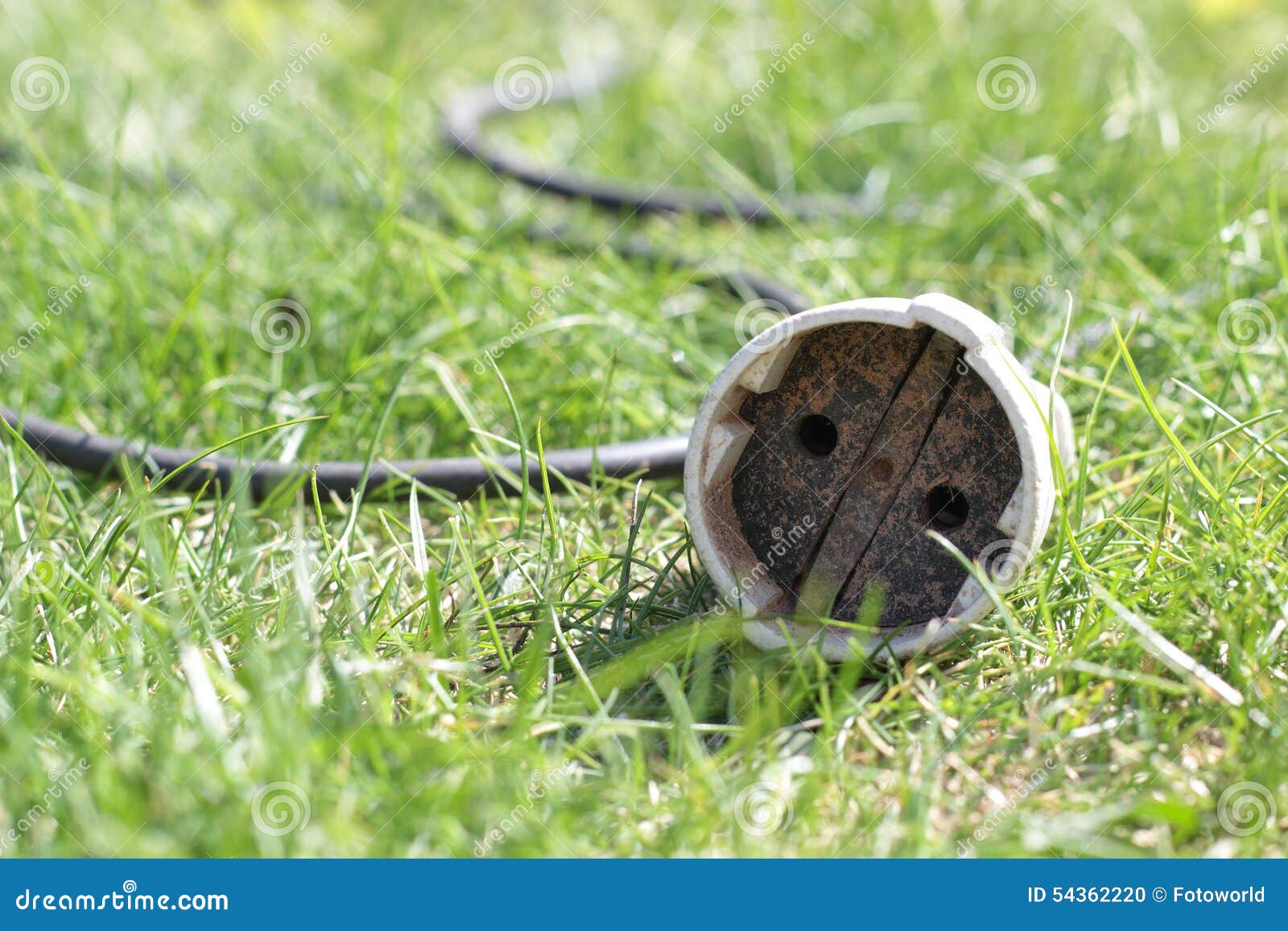 The Socket the Extender in a Grass Stock Photo - Image of closeup, 220v ...