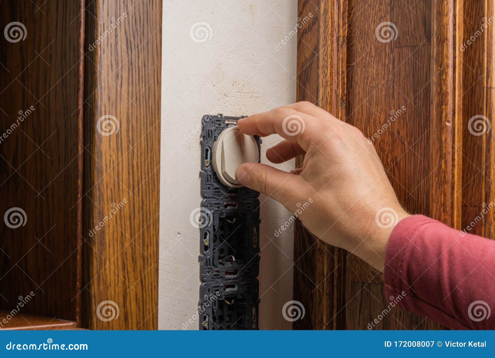 Socket Installation. A Master Electrician Installs An Electrical ...