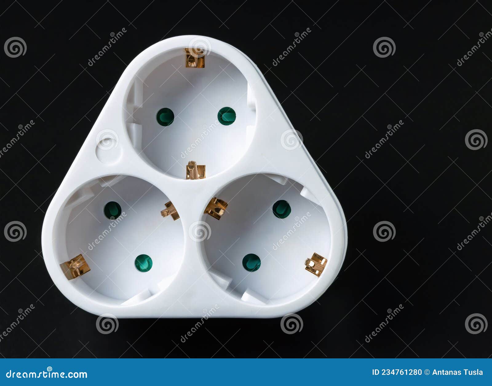 Socket Three-prong Adapter with Grounding on a Dark Background Stock ...