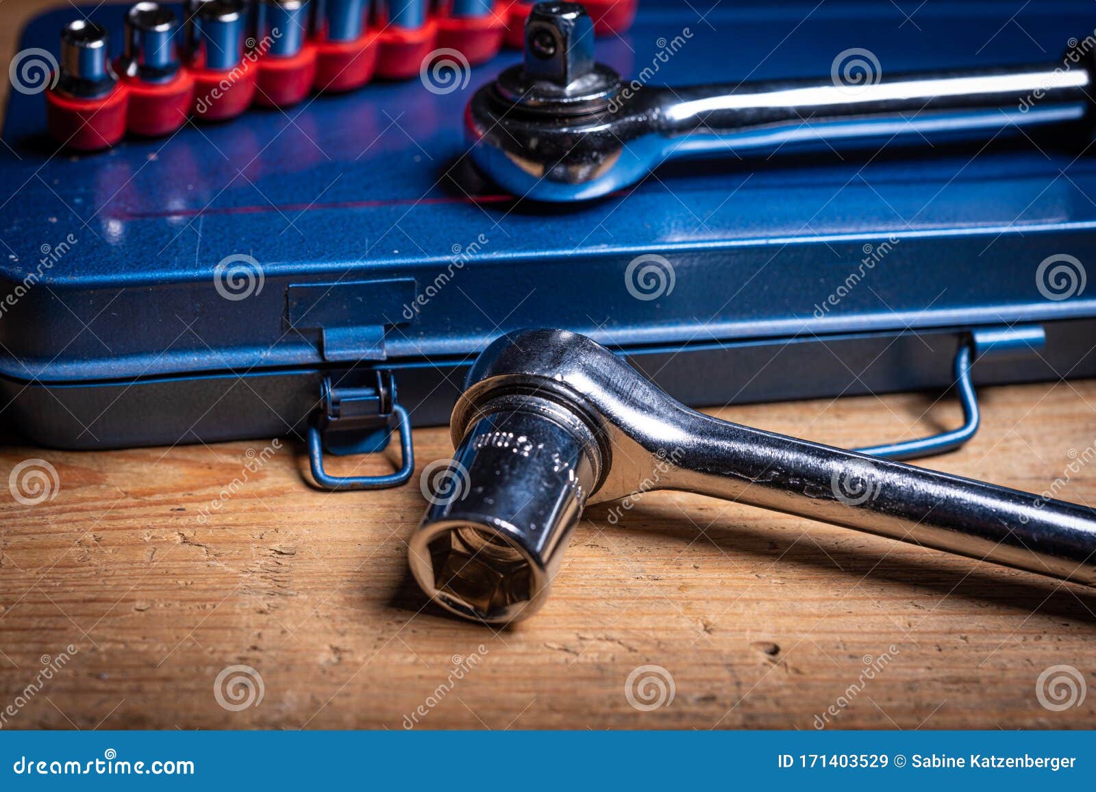 A Socket Wrench and Its Inserts on a Blue Tool Box Stock Image - Image ...
