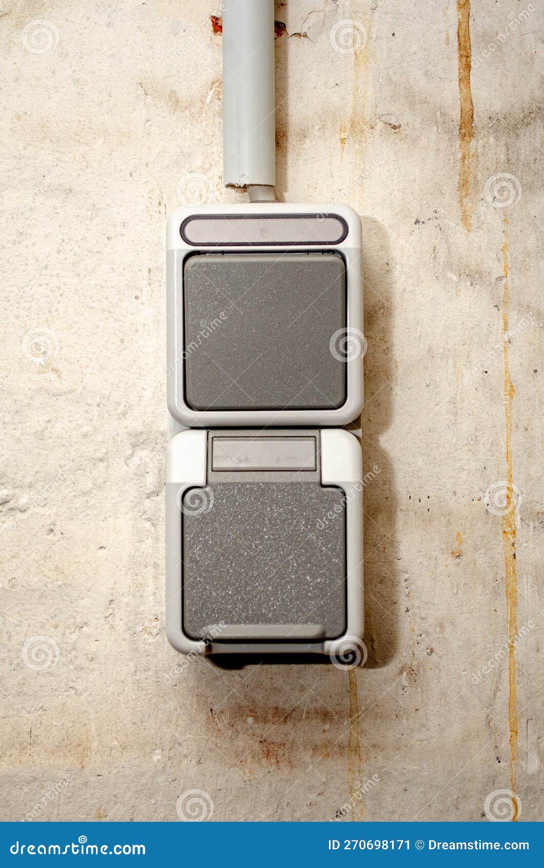 Sockets with a Protective Cover on the Wall with a Piece of Wire Stock ...