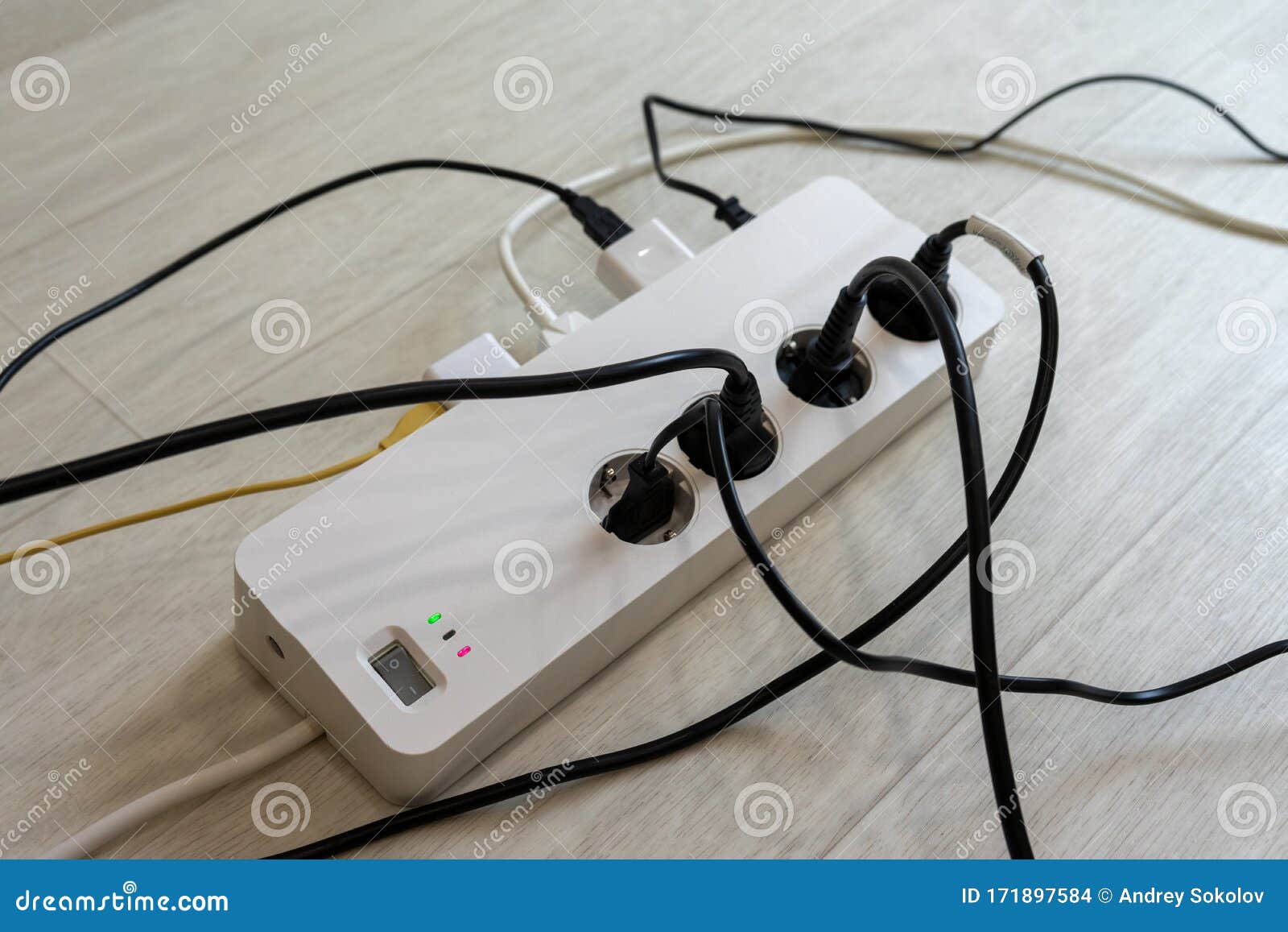 Sockets on Wire with Multiple Connected Electrical Appliances Stock ...