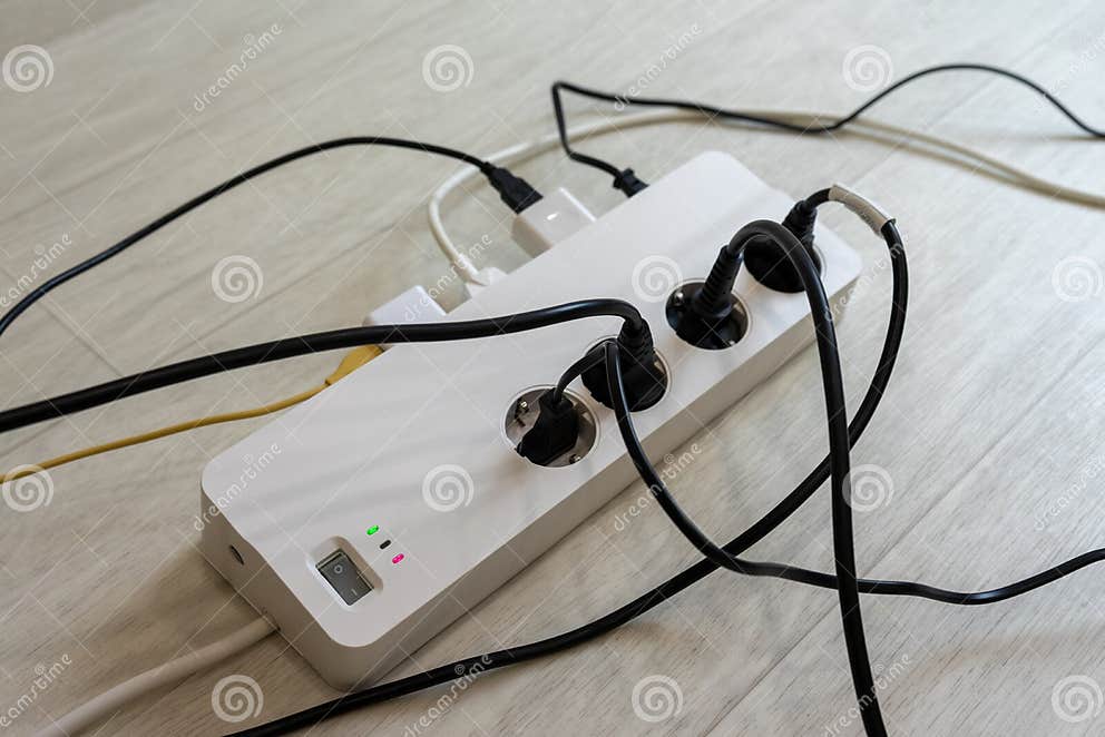 Sockets on Wire with Multiple Connected Electrical Appliances Stock ...