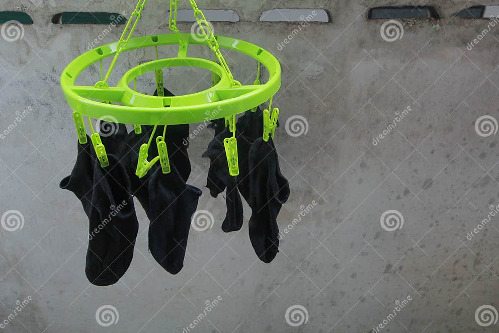 Socks drying stock photo. Image of cloth, green, clothes - 83857146