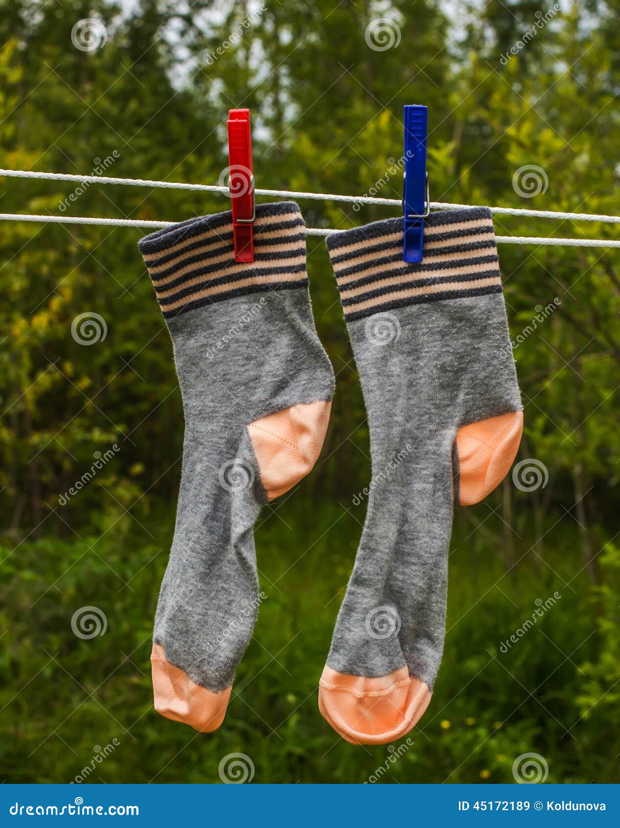 Socks Hanging on the Rope for Drying Clothes Stock Image - Image of ...
