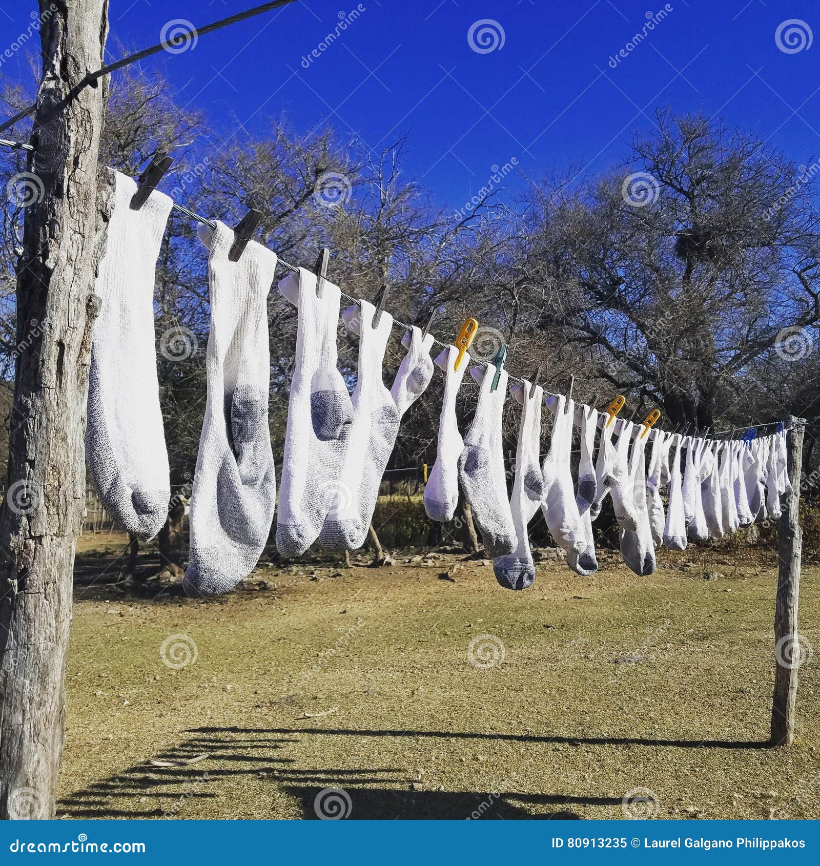 Socks on the laundry line stock image. Image of whimsical - 80913235