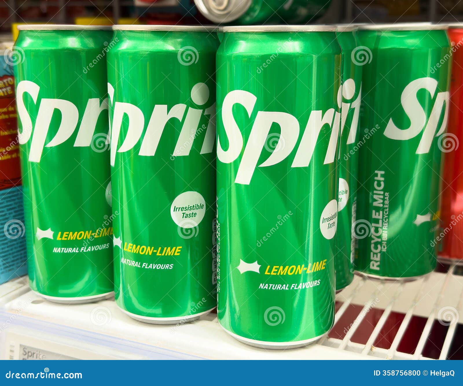 Soda Cans with Green Packaging and Lemon-lime Flavor in Store Display ...