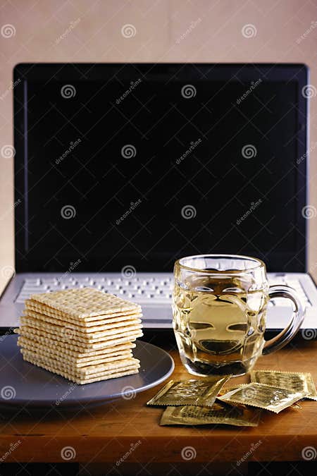 Soda Crackers, Cup of Tea and a Computer Stock Photo - Image of biscuit ...