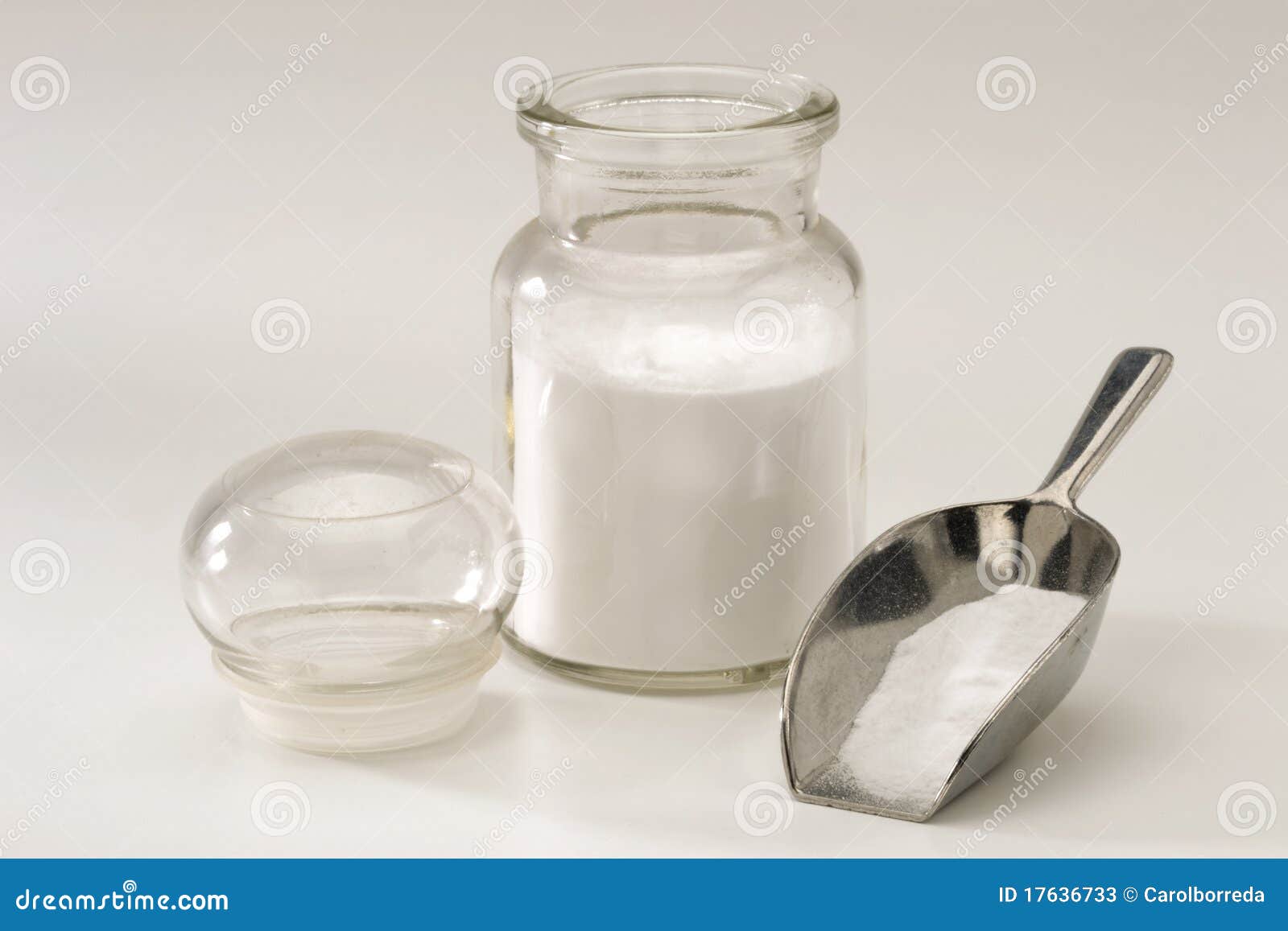 Sodium Bicarbonate In A Glass Jar With A Flower On A Blue Background ...