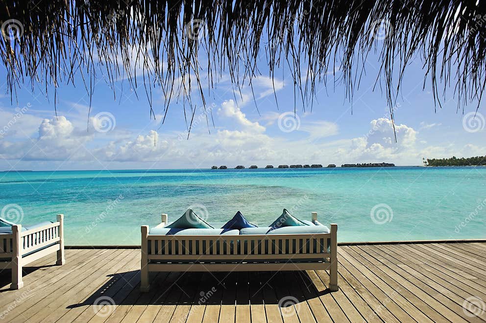Sofa on beach stock image. Image of water, restaurant - 12599705