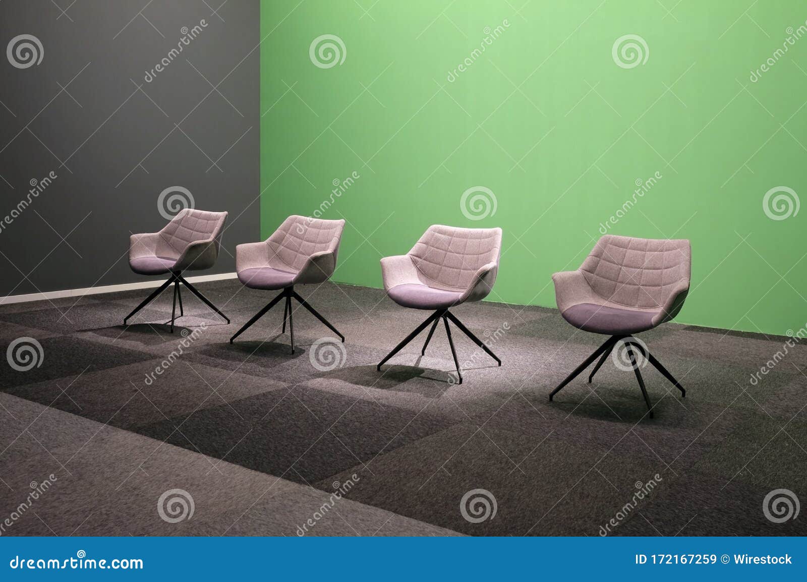Sofa Chairs Under the Lights Against a Green Screen in a Studio Stock ...