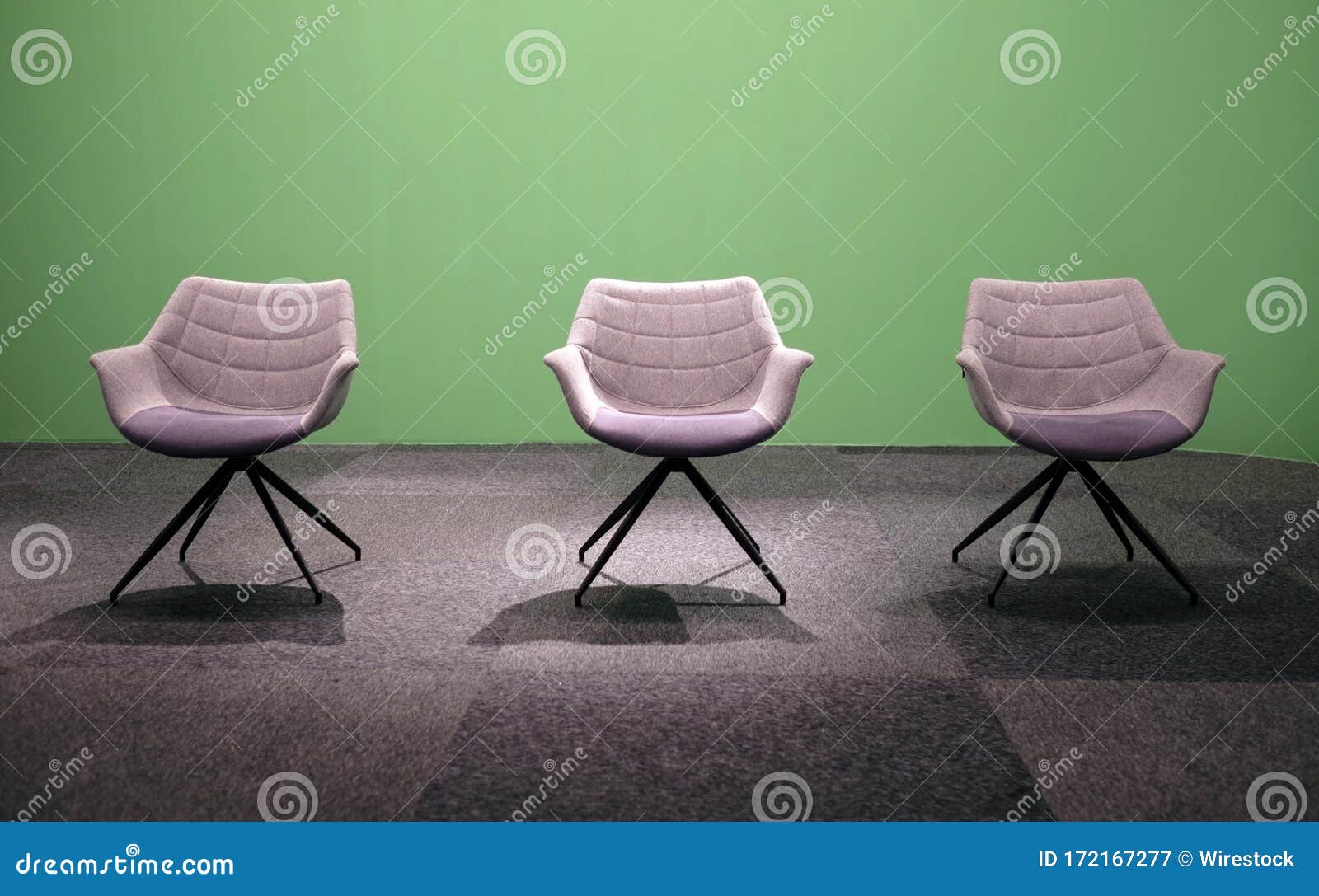 Sofa Chairs Under the Lights Against a Green Screen in the Studio Stock ...