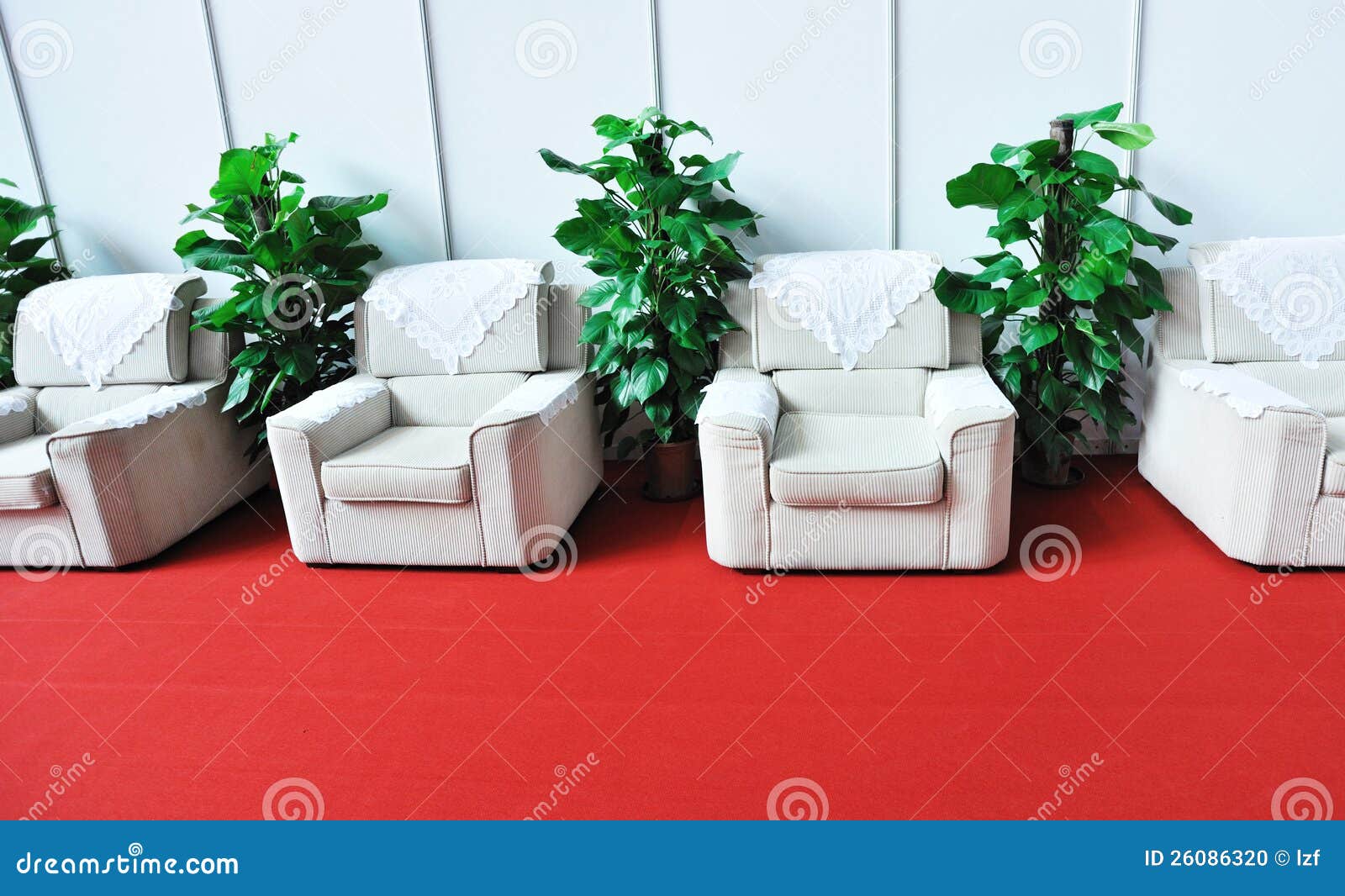 Sofa and green plants stock photo. Image of antechamber - 26086320
