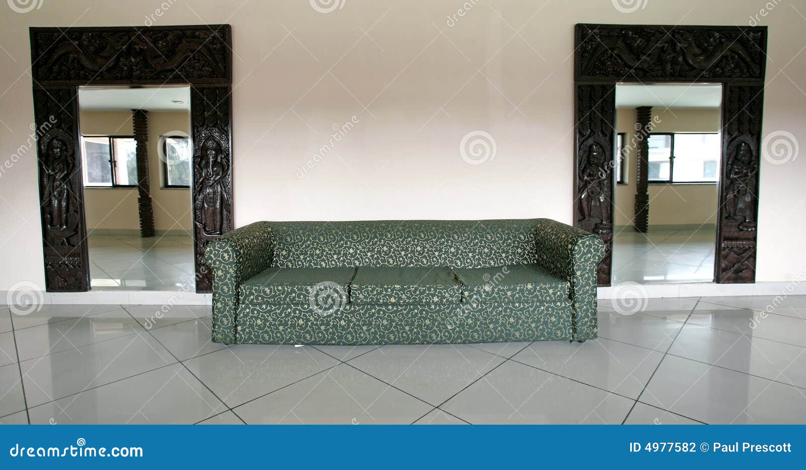 Sofa and mirrors in hall stock photo. Image of flat, cozy - 4977582