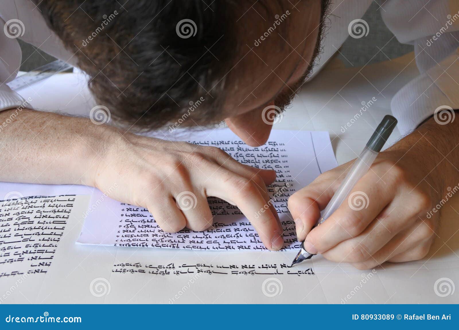 Sofer writes a sefer Torah stock image. Image of focus - 80933089