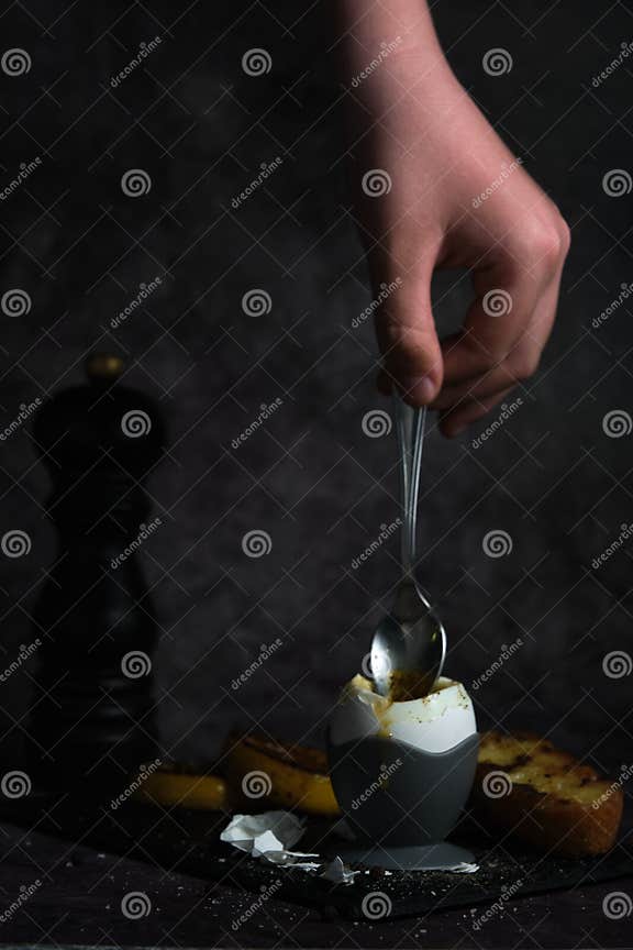 Soft-boiled egg on a stand stock photo. Image of object - 219700298