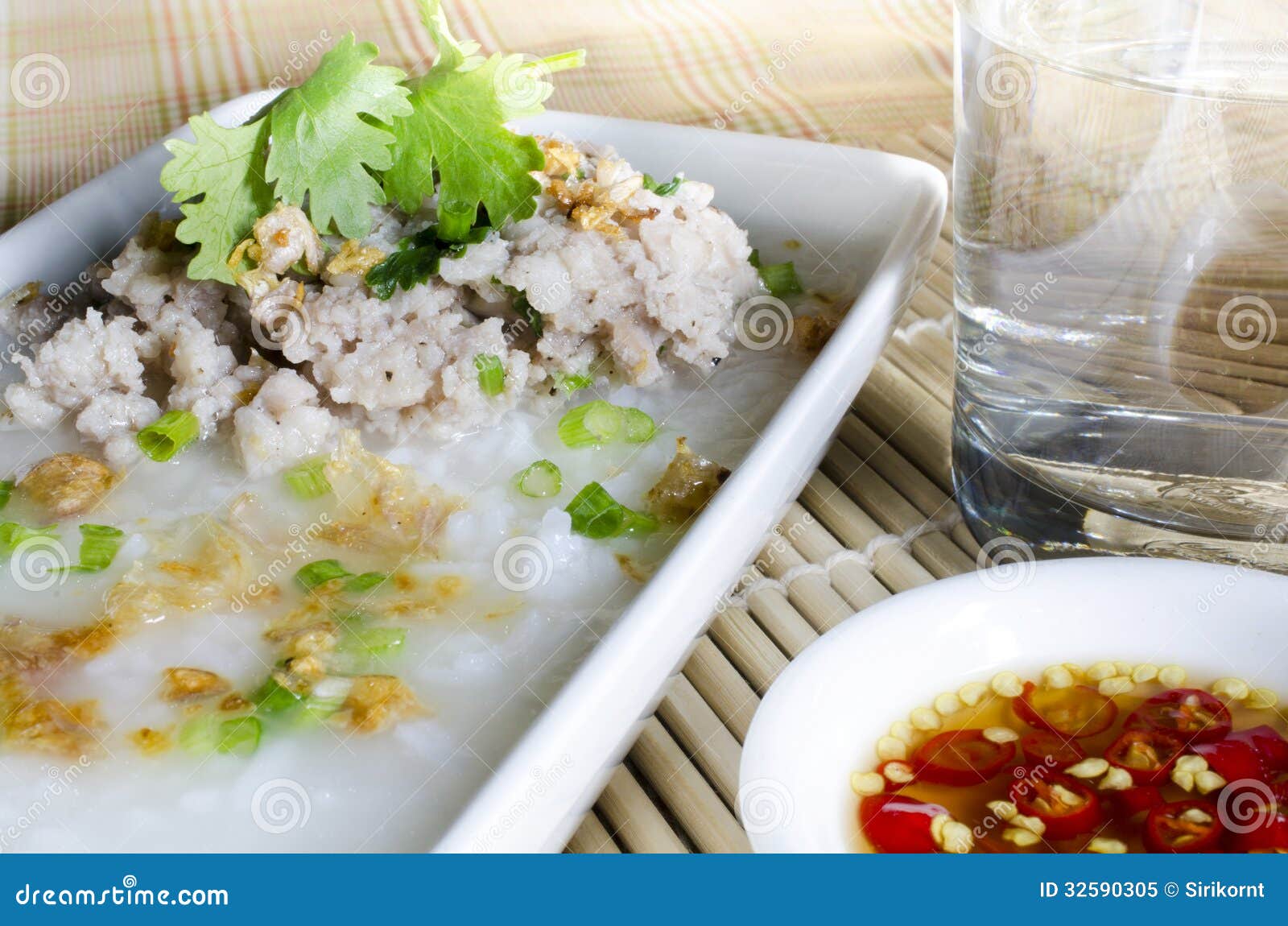 Soft-boiled Rice Pork with Glass of Water and Fish Sauce Stock Image ...