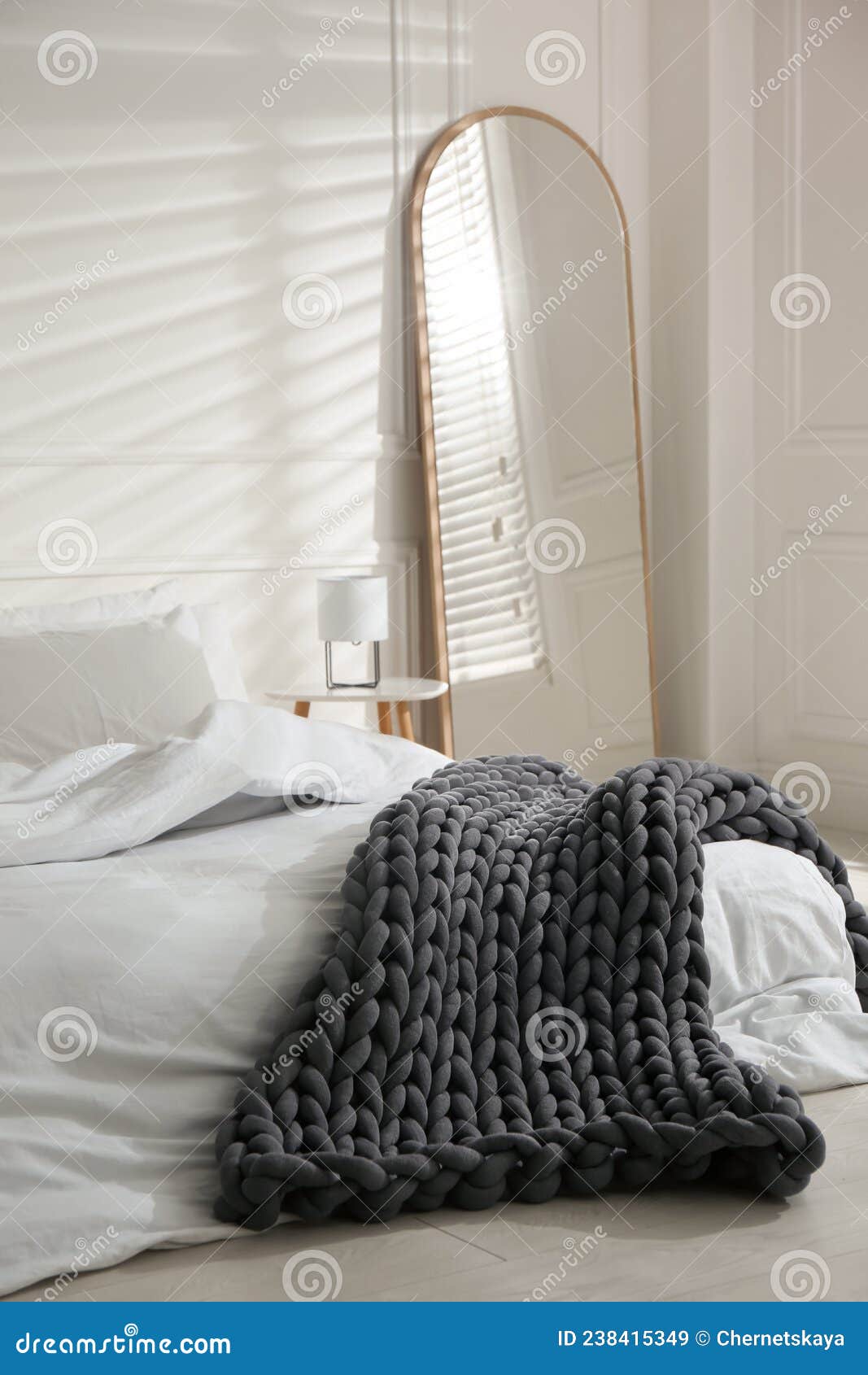 Soft Chunky Knit Blanket on Bed in Room Stock Image - Image of ...