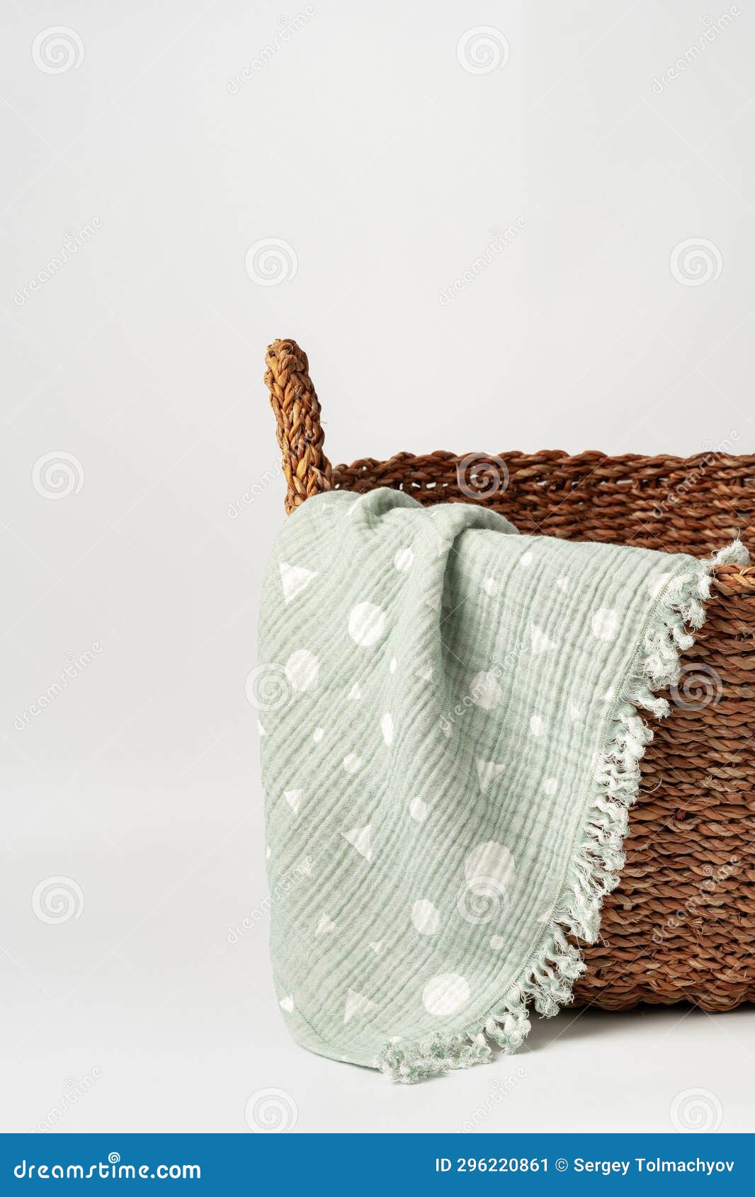 Soft Cotton Blanket in a Straw Basket on White Background Stock Image ...
