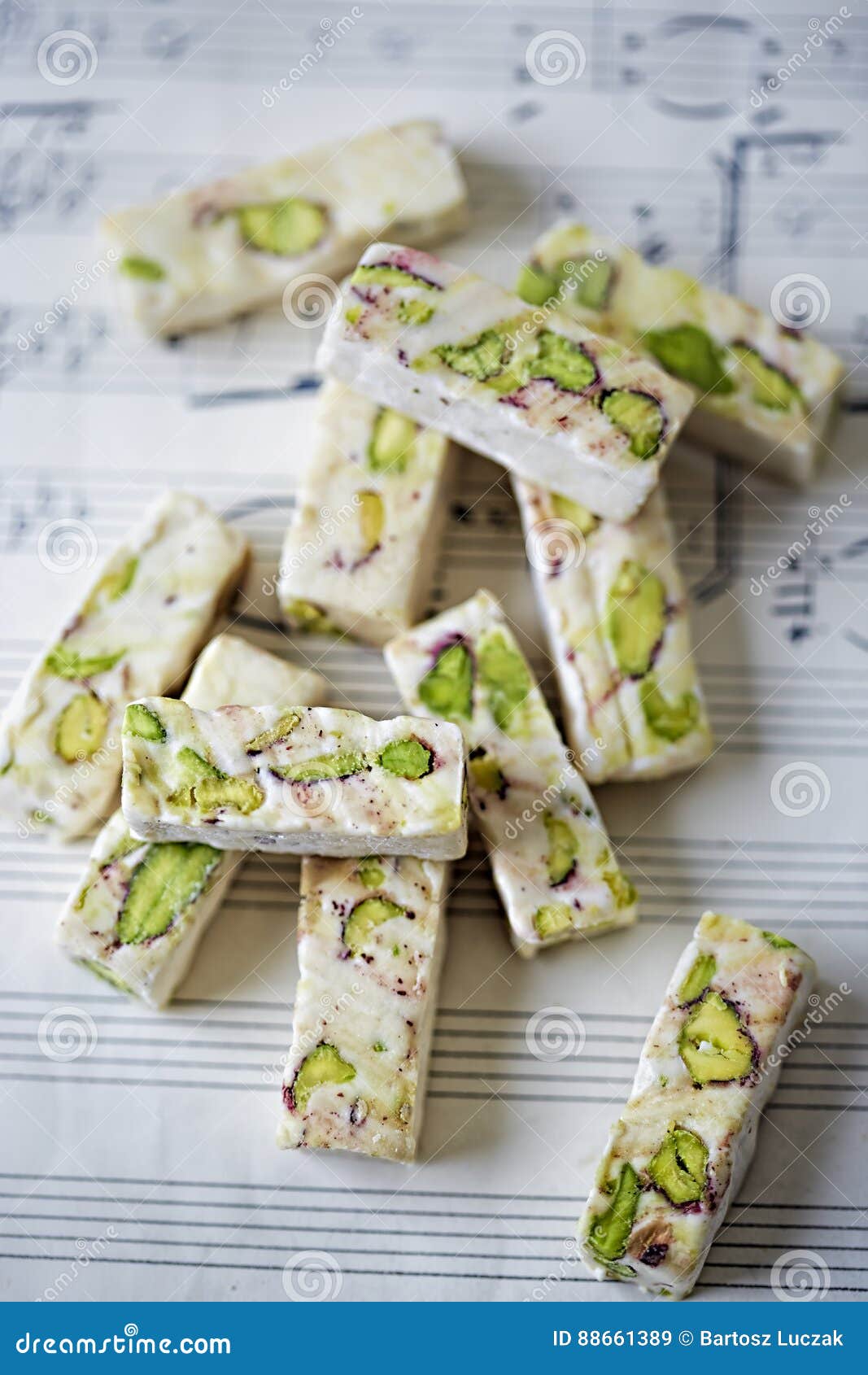 Soft cubes of white nougat stock image. Image of pistachio - 88661389