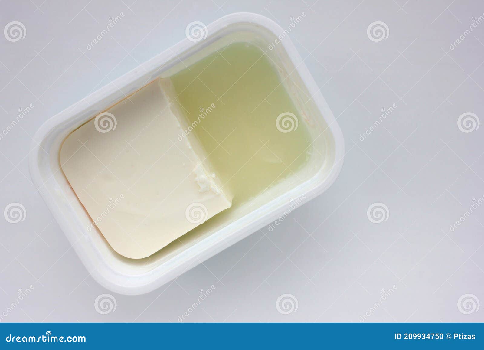 Soft Feta Cheese in Plastick Package on White Background. Overhead View ...