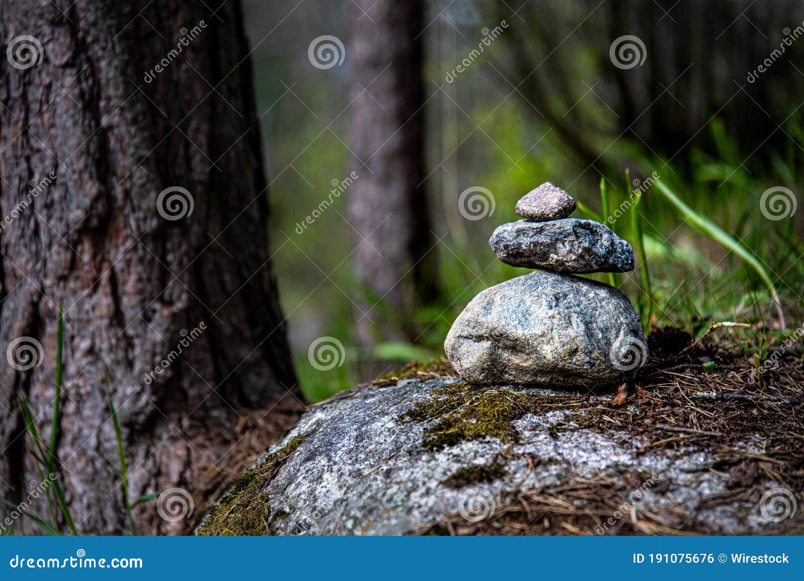 Soft Focus of a Stack of Stones on a Rock in the Woods Stock Photo ...