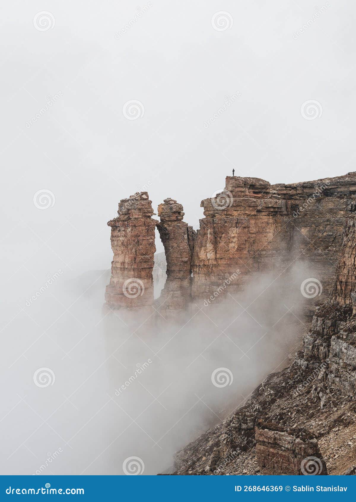 Vertical View of Sharp Rocks in the Fog. Mountains in a Dense Fog Stock ...