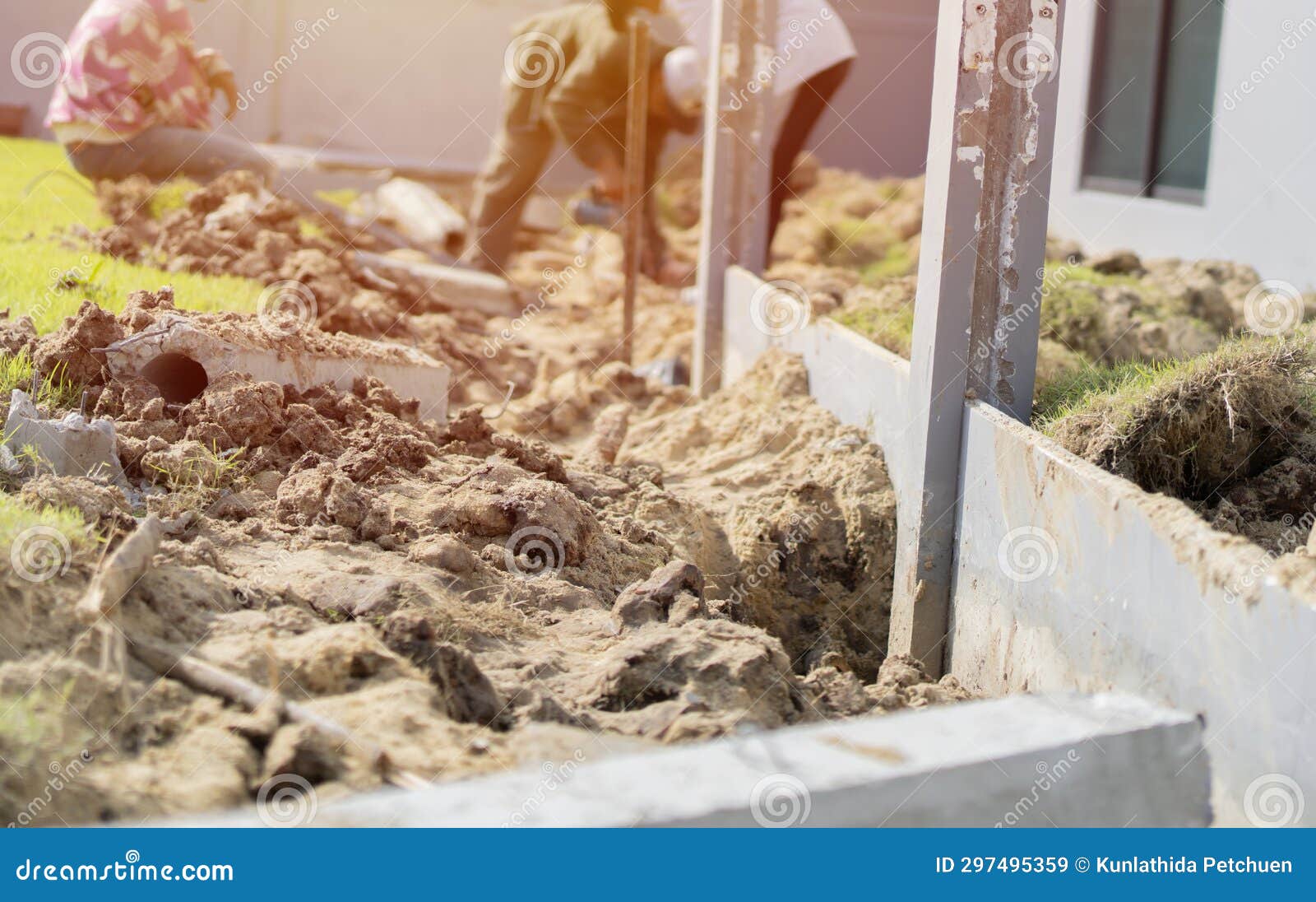 Soft Focus of Worker Digs Soil with Spade Prepare Around Pole Stucture ...
